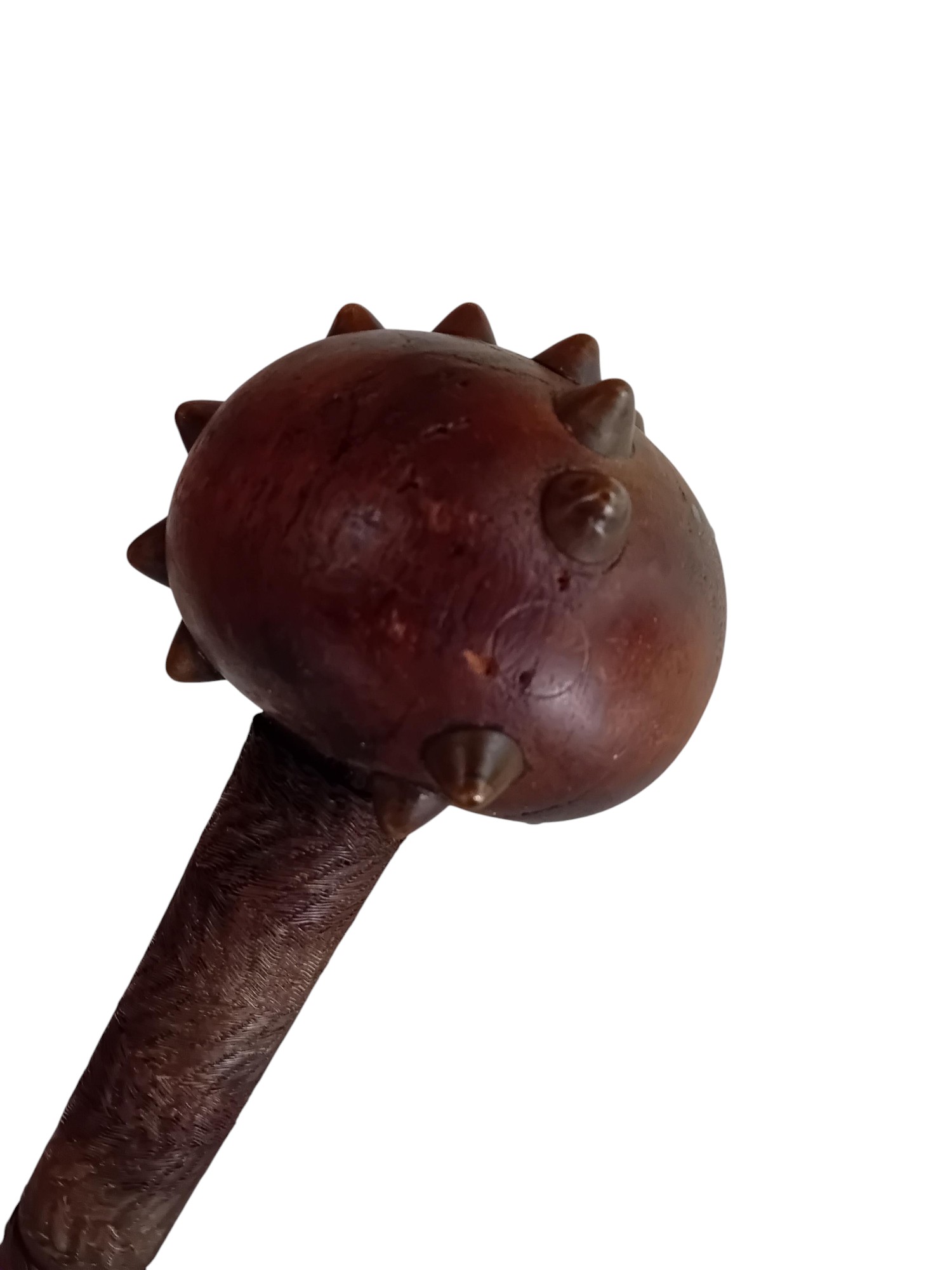 A southern African tribal knobkerrie, having brass studs and an iron ...