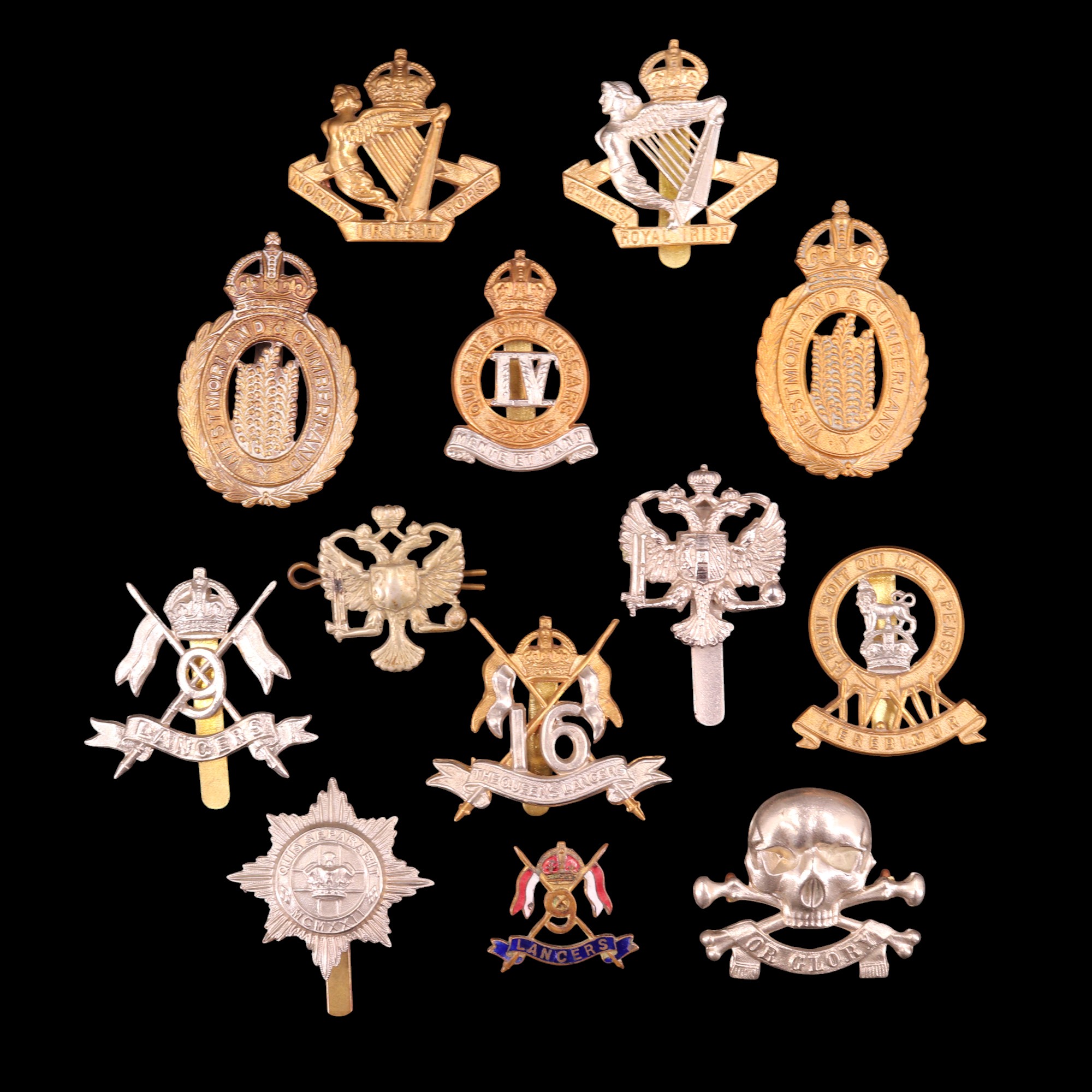 A group of yeomanry and cavalry cap badges