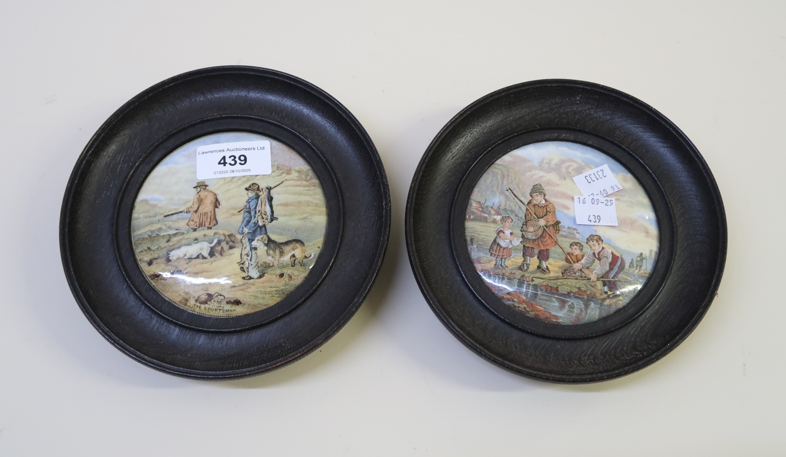 Two circular oak framed Prattware pot lids, ' The Sportsman ' and ' The ...