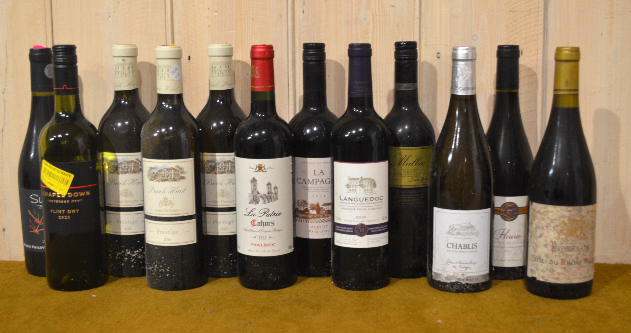 Two bottles Malbec 2010, three bottles Puech-Haut Prestige 2016 and ...