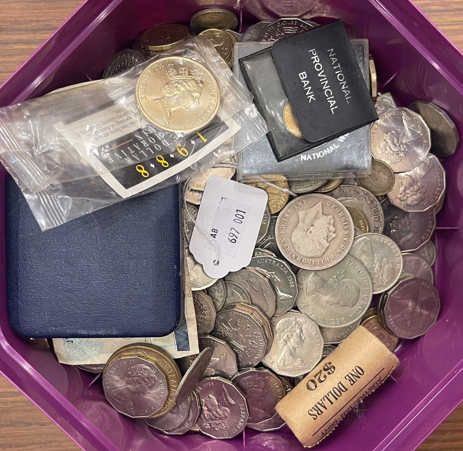 A box of assorted crowns, coinage, Jack Nicklaus £5 note, roll of ...