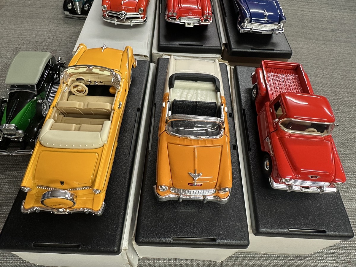 Collection of die cast American cars and trucks in original boxes