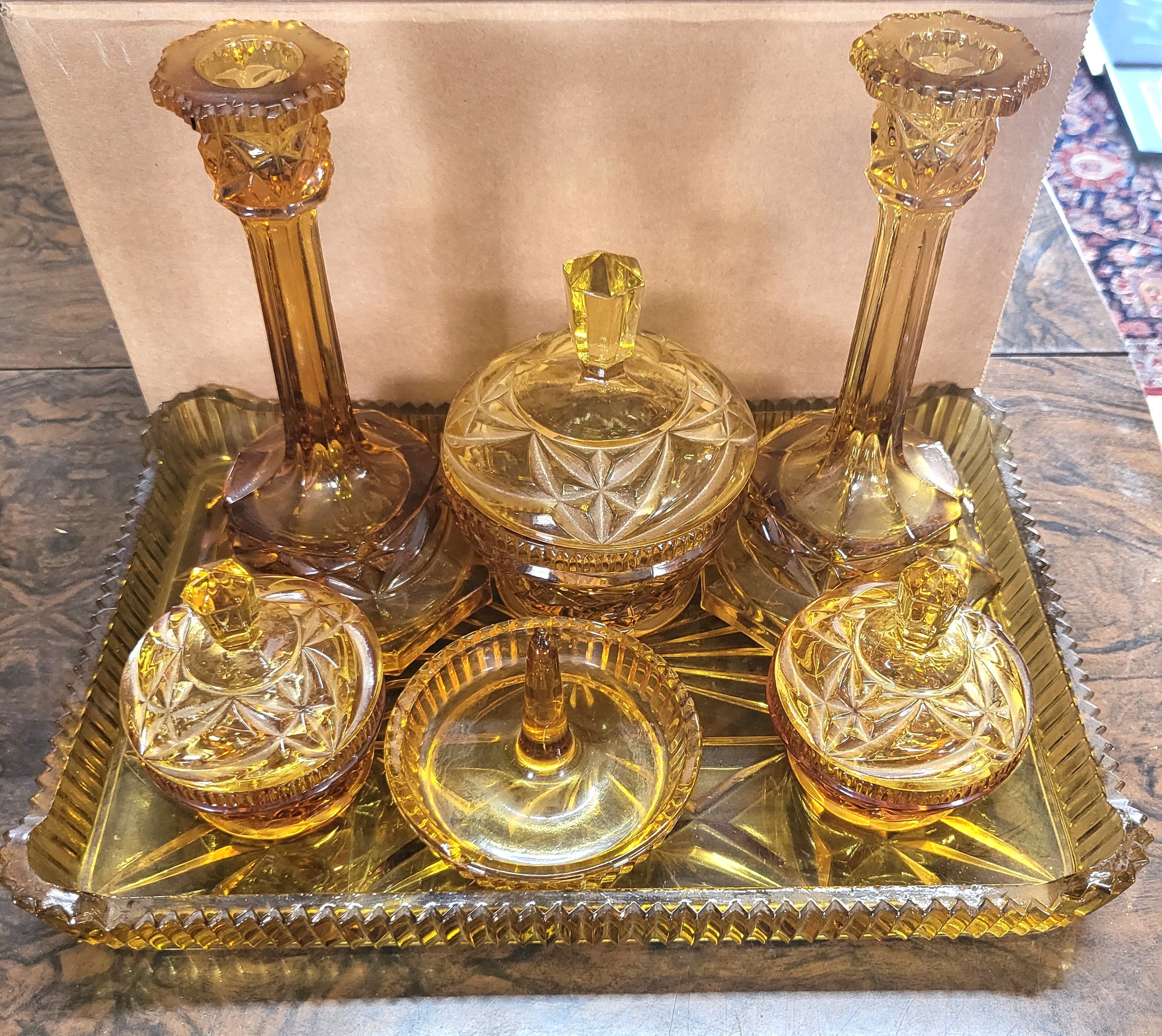 A 1930's Art Deco amber glass dressing table set with matching candle ...