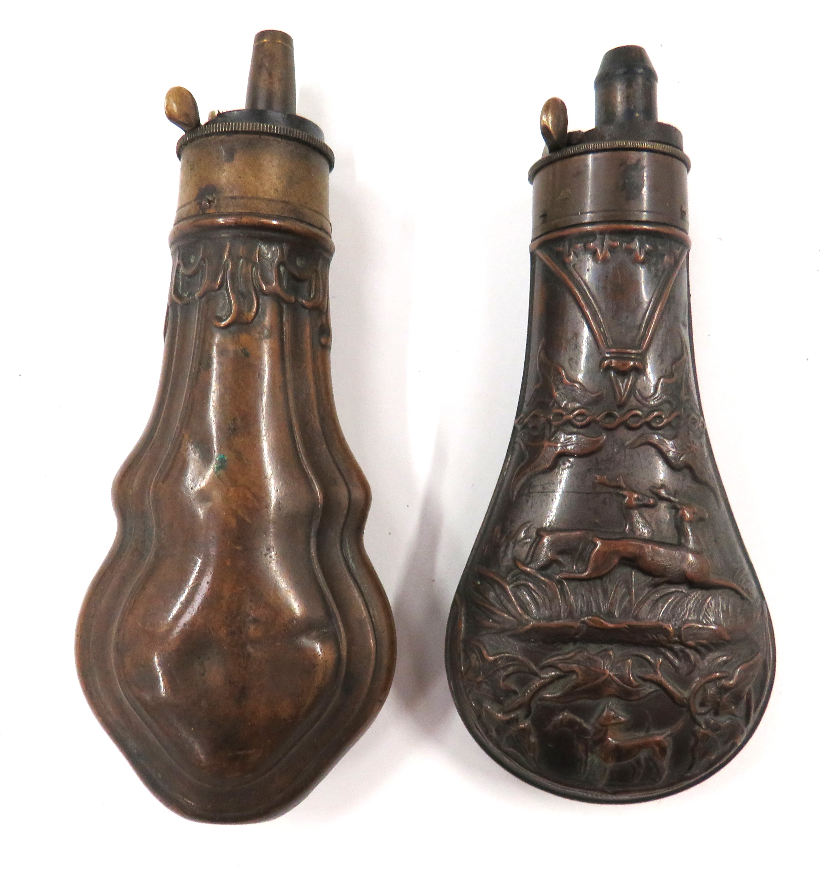 Two 19th Century Pistol Powder Flasksconsisting darkened copper ...