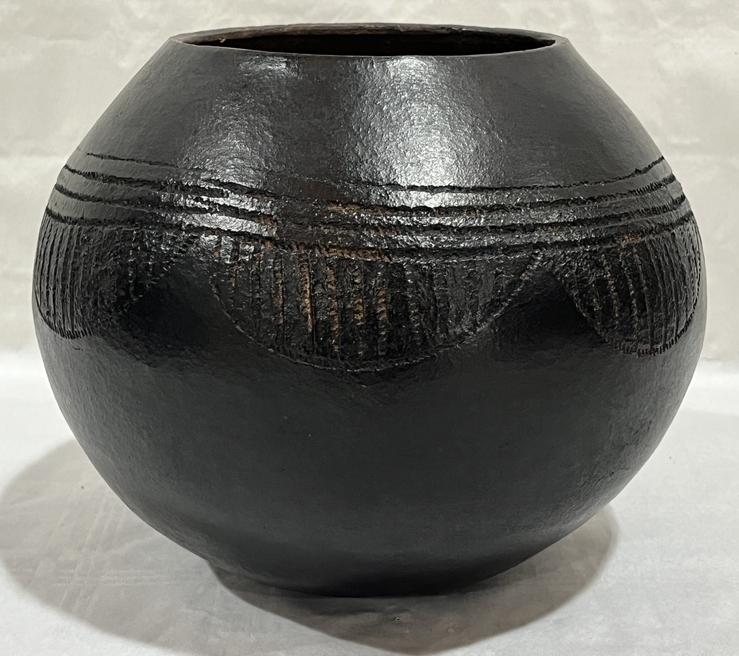 African Zulu sorghum beer brewing and serving pot or ukhamba, coil ...