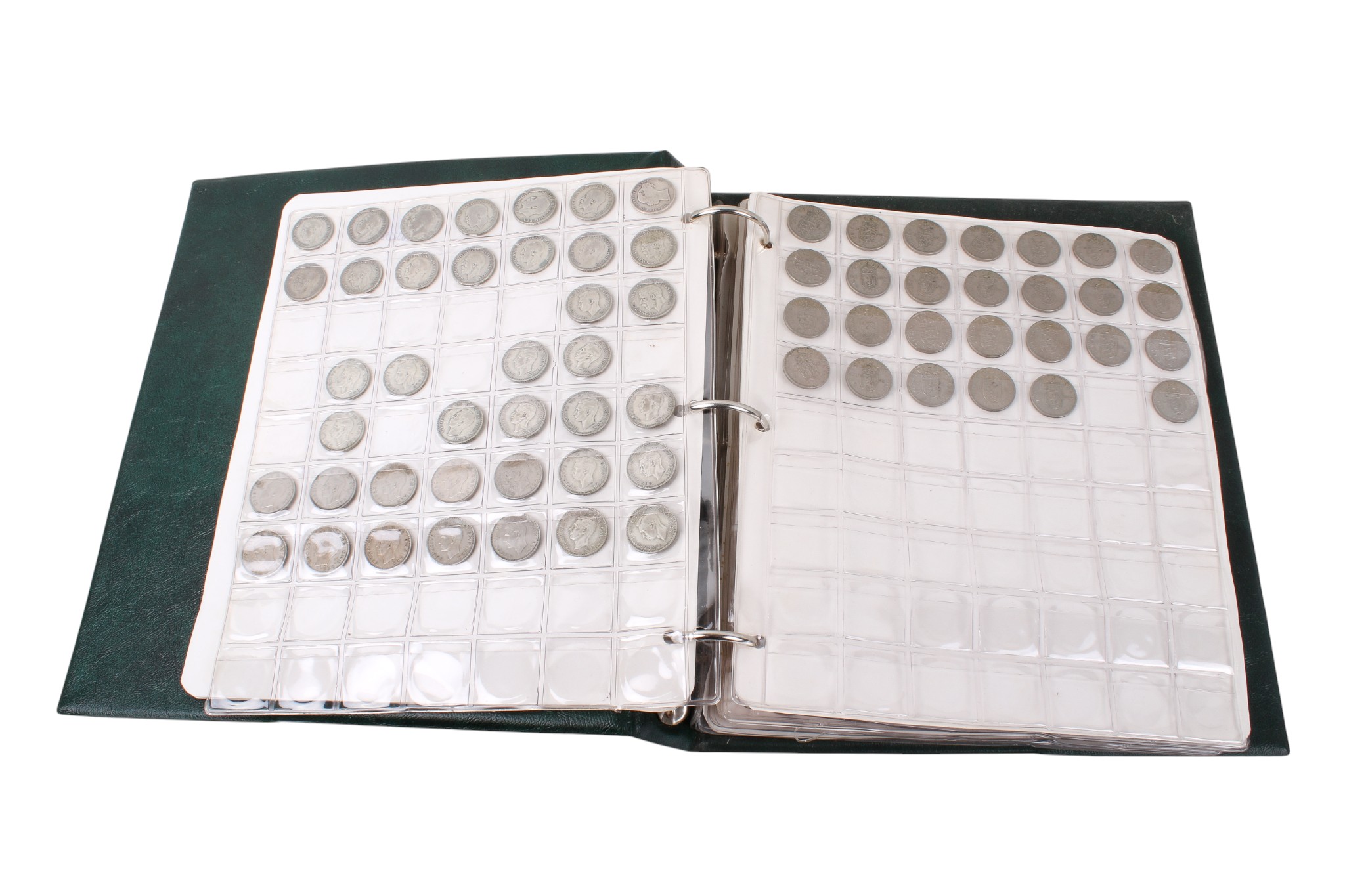 An album of pre-decimal coins. With a good quantity of pre-1947 silver ...