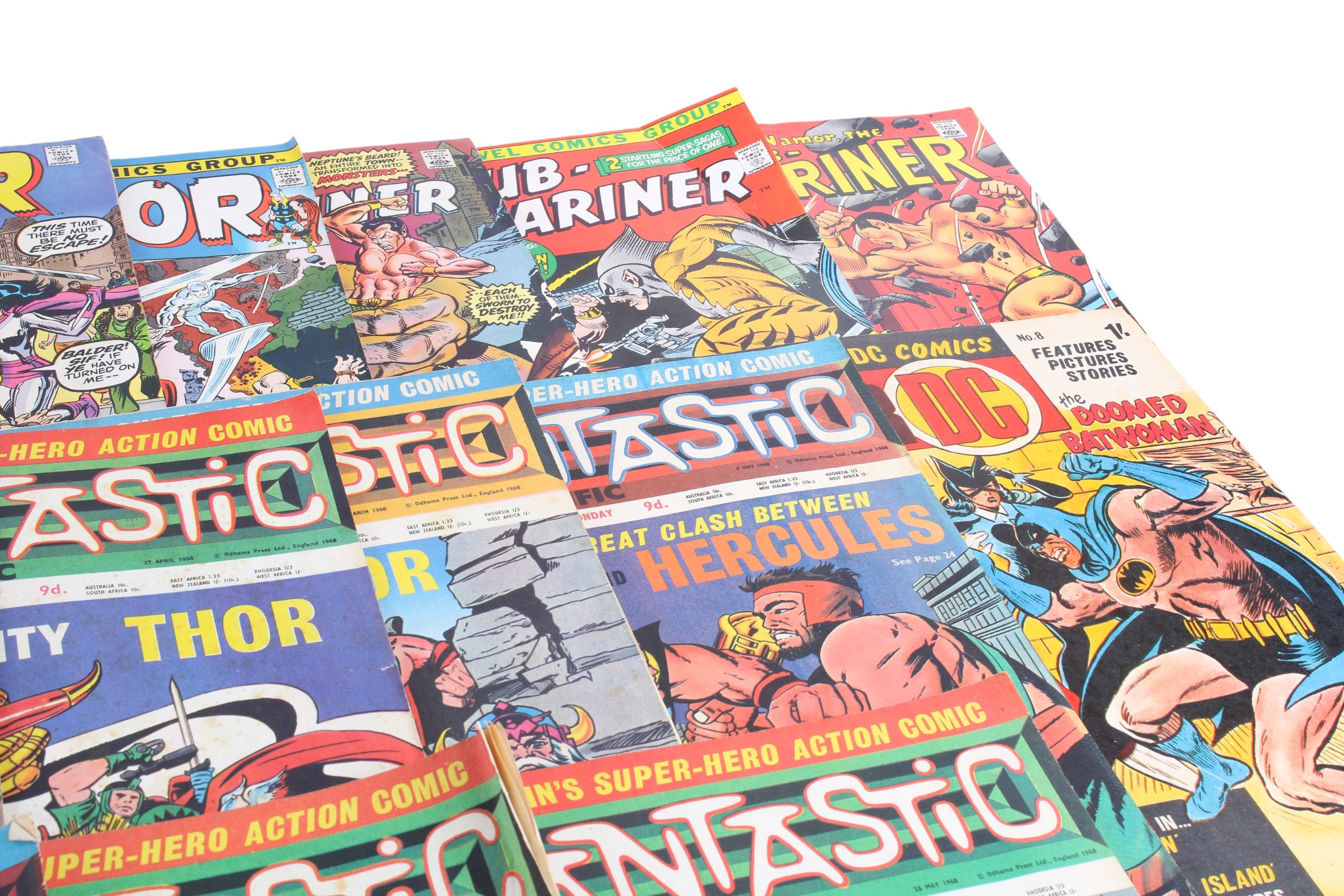 A collection of vintage reprint superhero comics. Including twelve ...