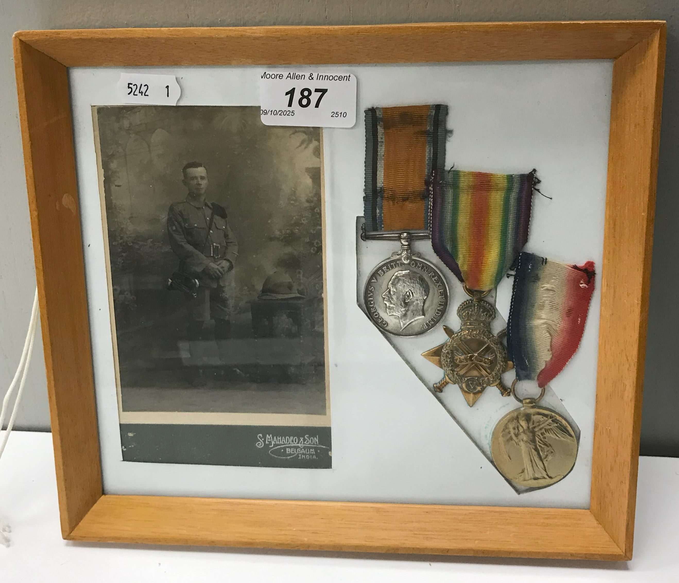 A framed and glazed set of World War I trio medals (Pip, Squeak and ...