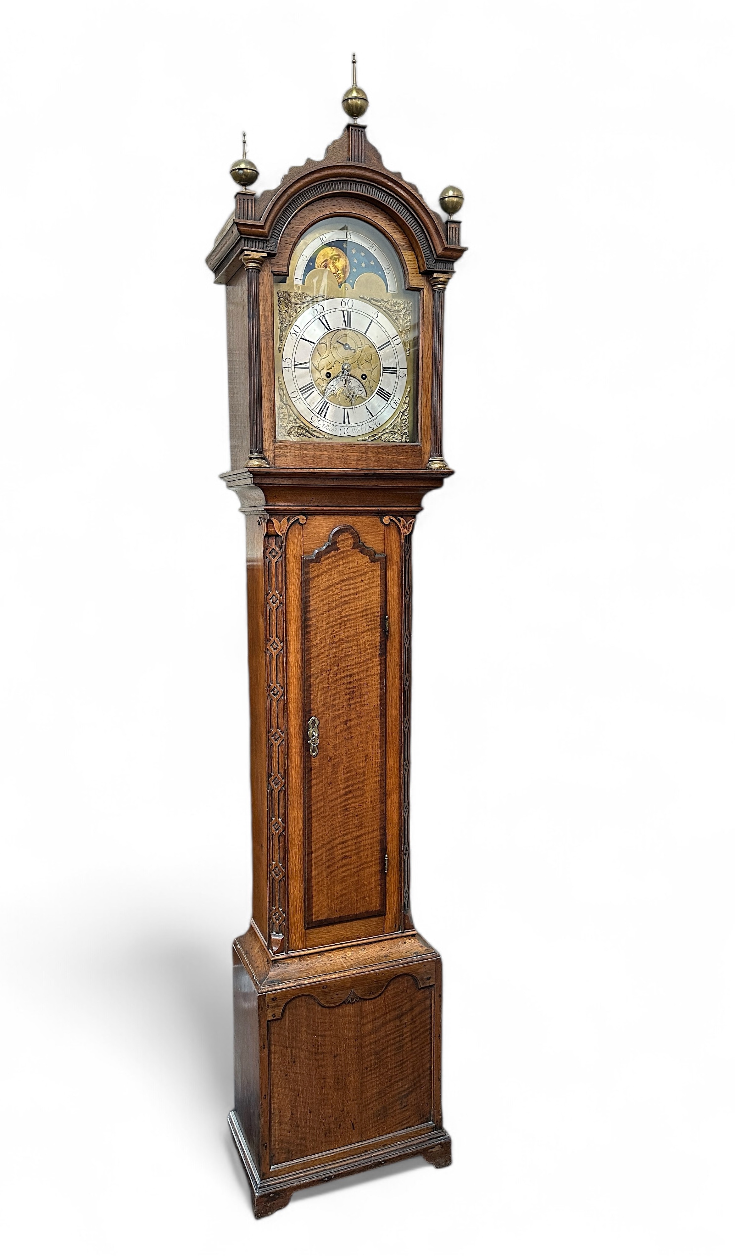 An 18th century longcase clock, with eight-day movement striking a bell ...