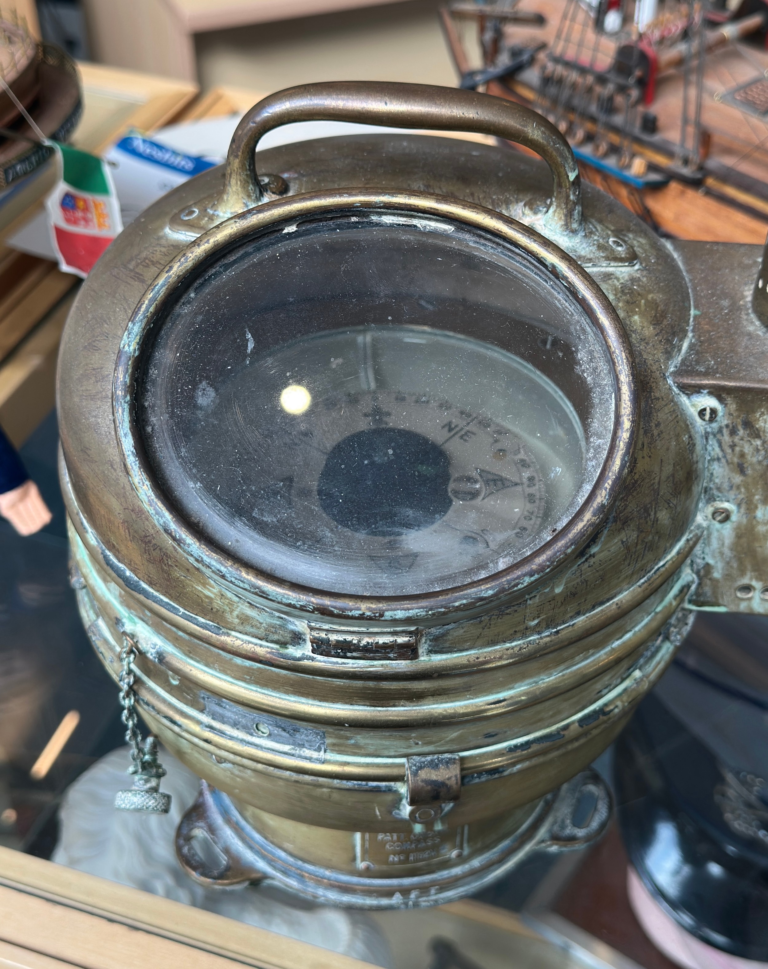 A 20th Century brass cased ship’s binnacle and compass, applied plaque ...