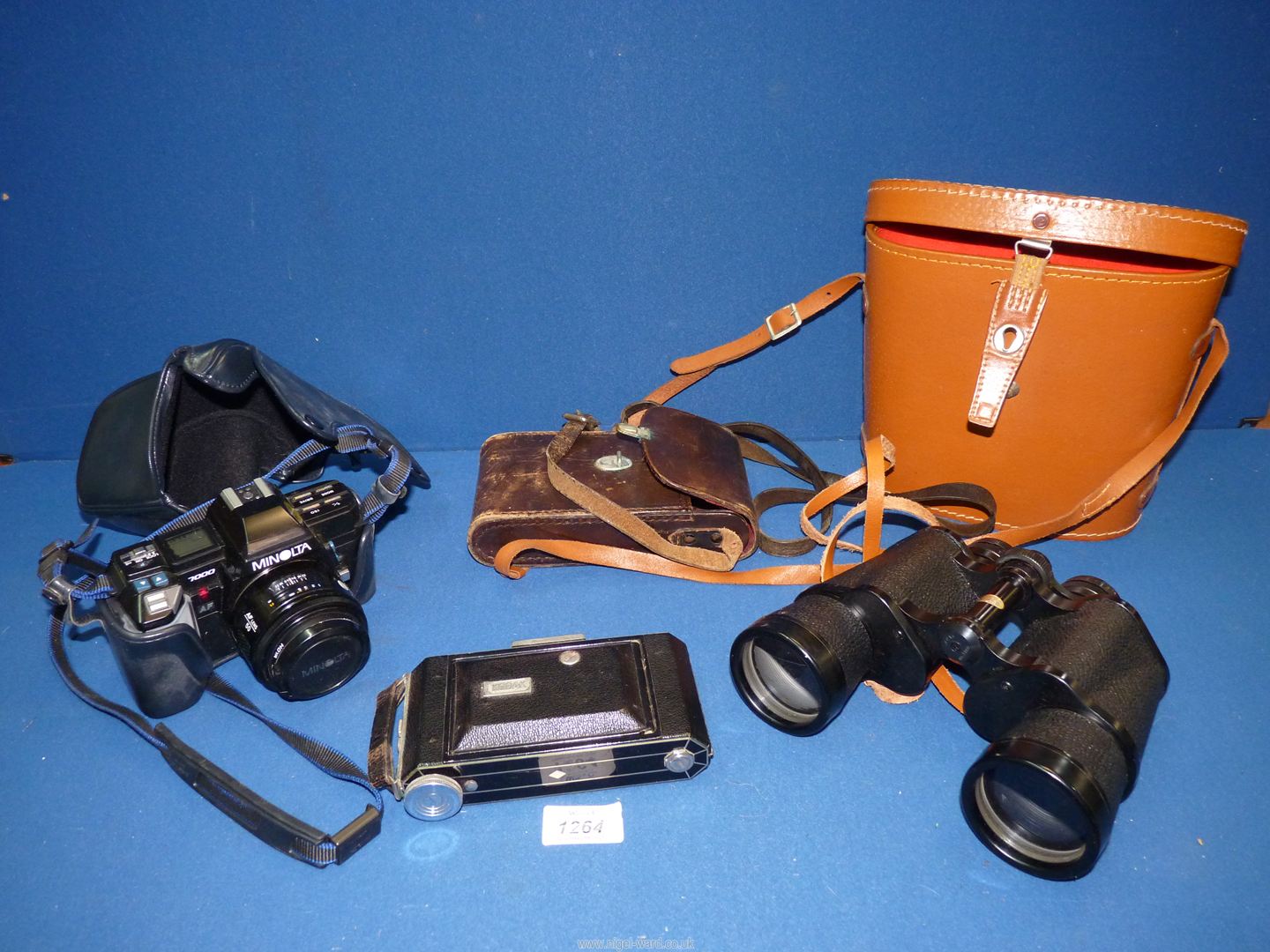 A 'Minolta' 7000 SLR camera, together with a 'Kodak' Compur folding ...
