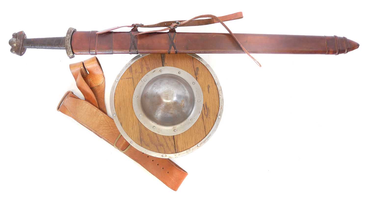 Replica of a Viking broadsword, also a small wood and steel shield and ...