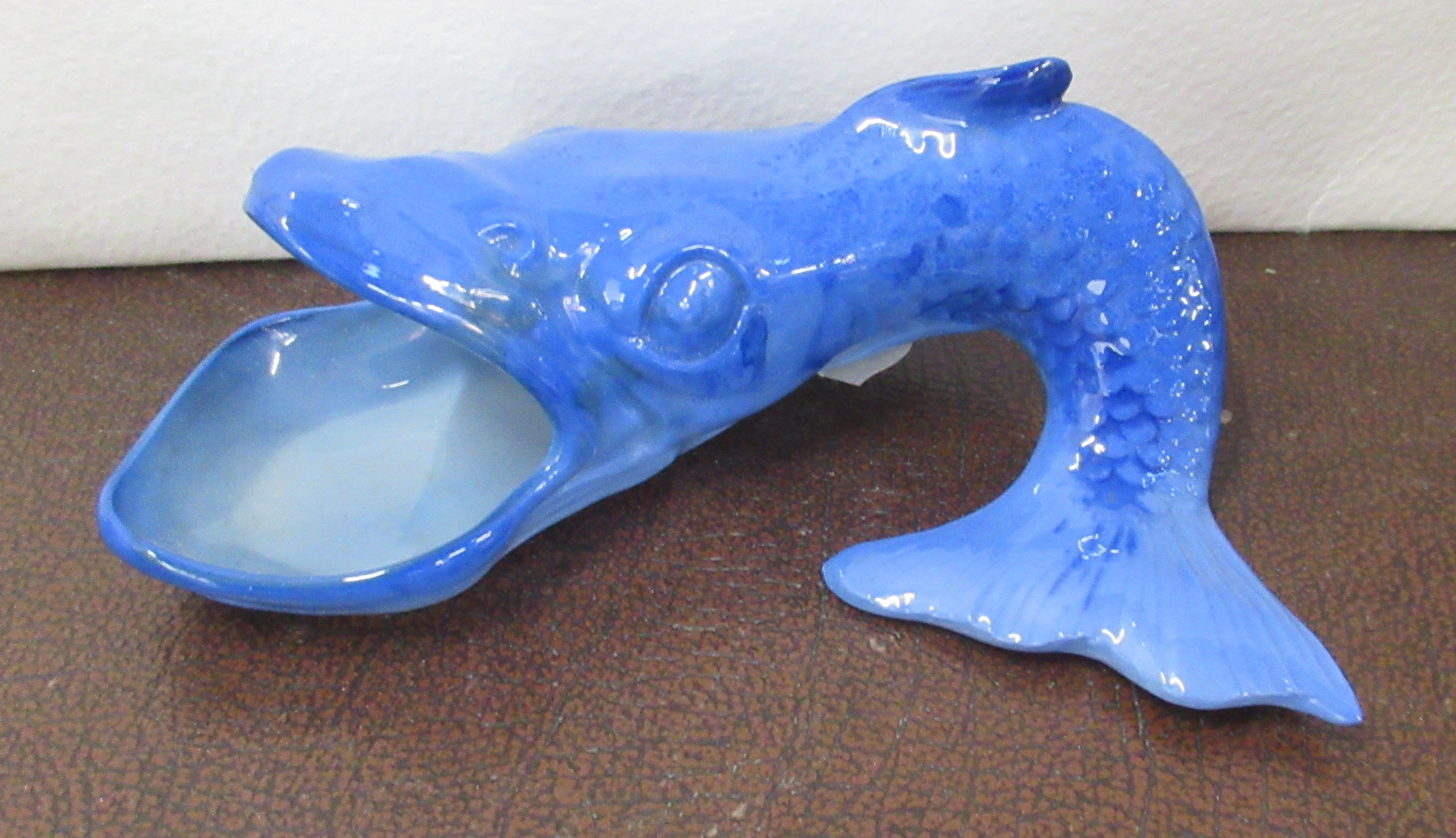 A Royal Worcester Sabrina porcelain spoon warmer, formed as a fish with ...