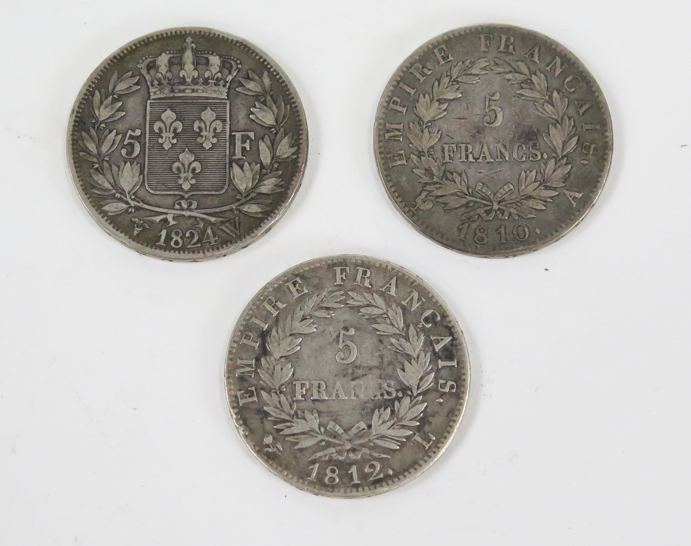Two French silver five franc coins (1810, 1812 and 1824)