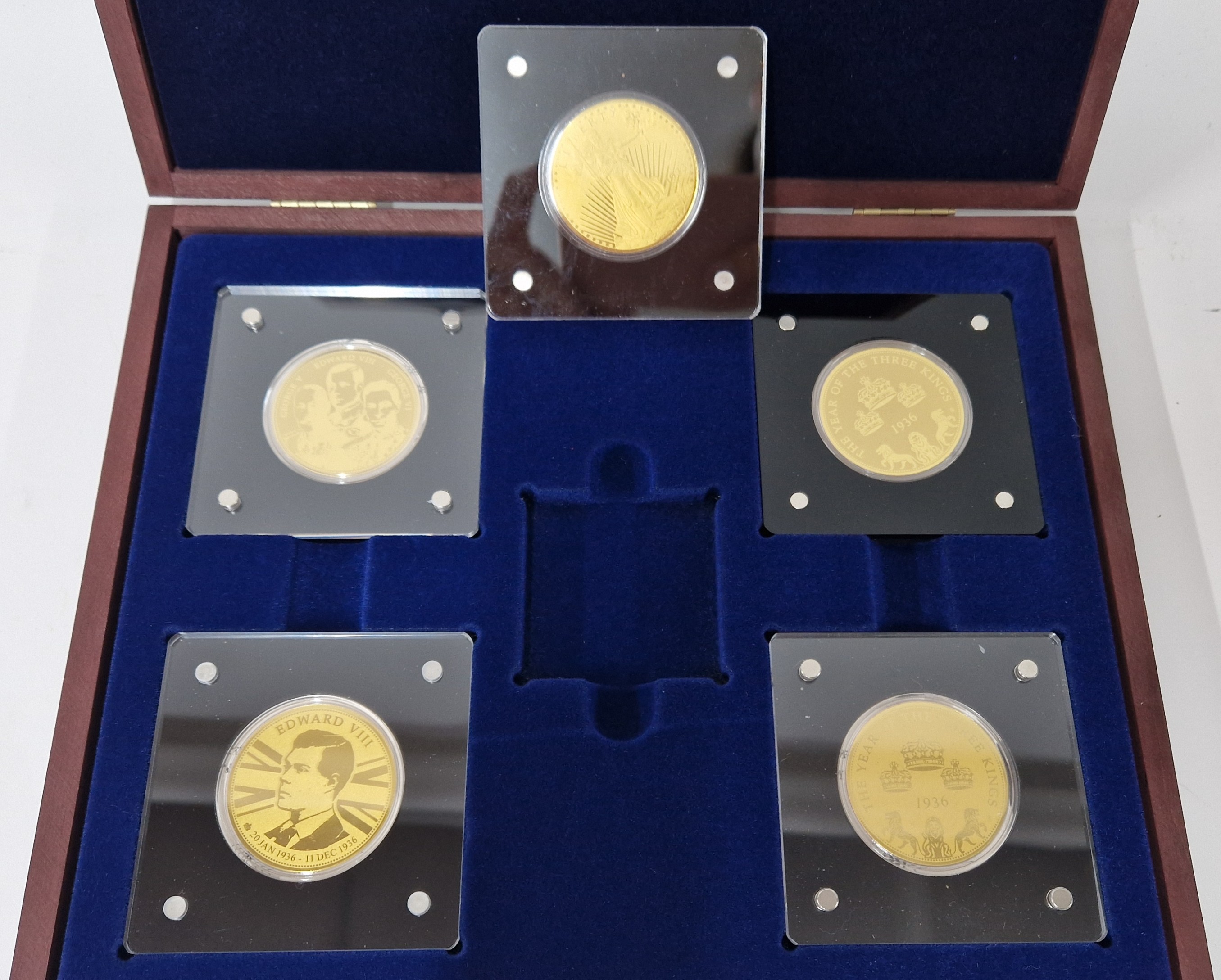 A 'Year of the Three Kings 1936' commemorative gold set of four coins ...