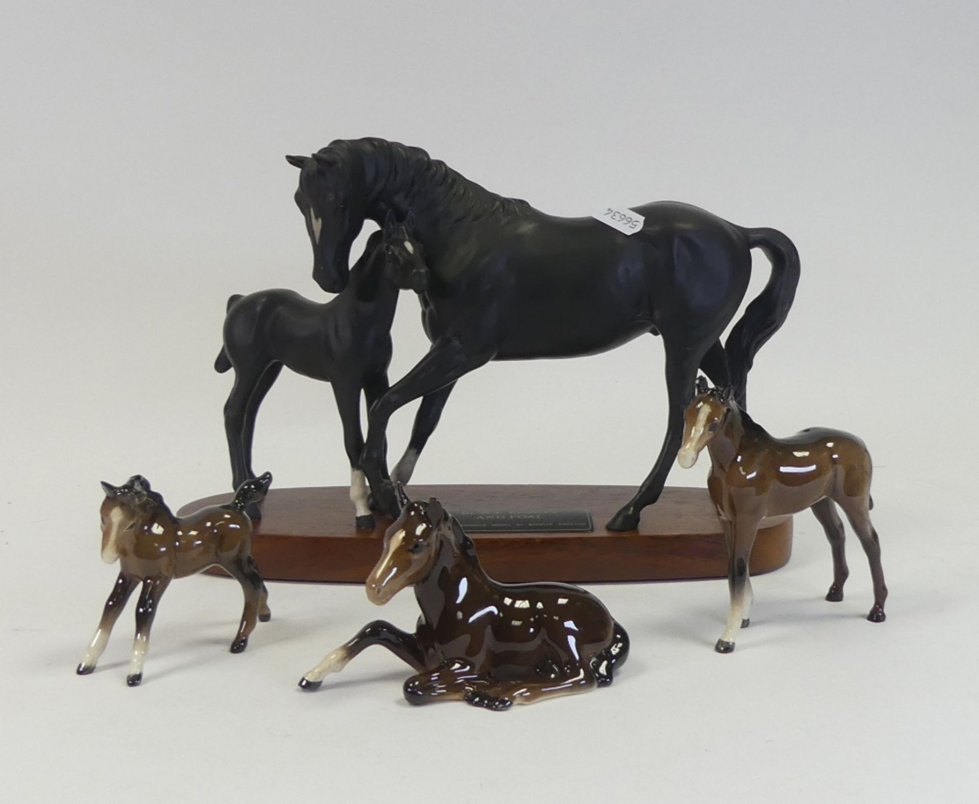 Beswick Horses to include:- Black Beauty and Foal on wooden plinth ...