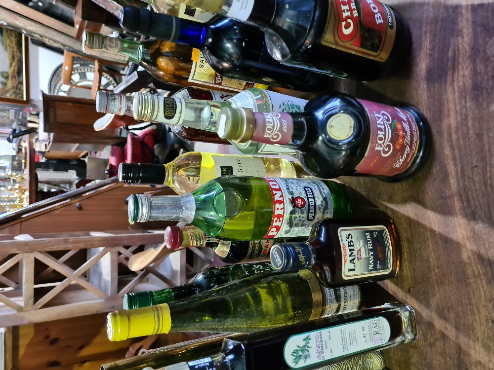 Mixed alcohol, including Drambuie and Cherry Brandy