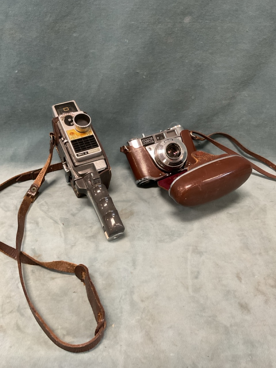 Two cased pairs of Commodore 10 x 50 field binoculars; and ...