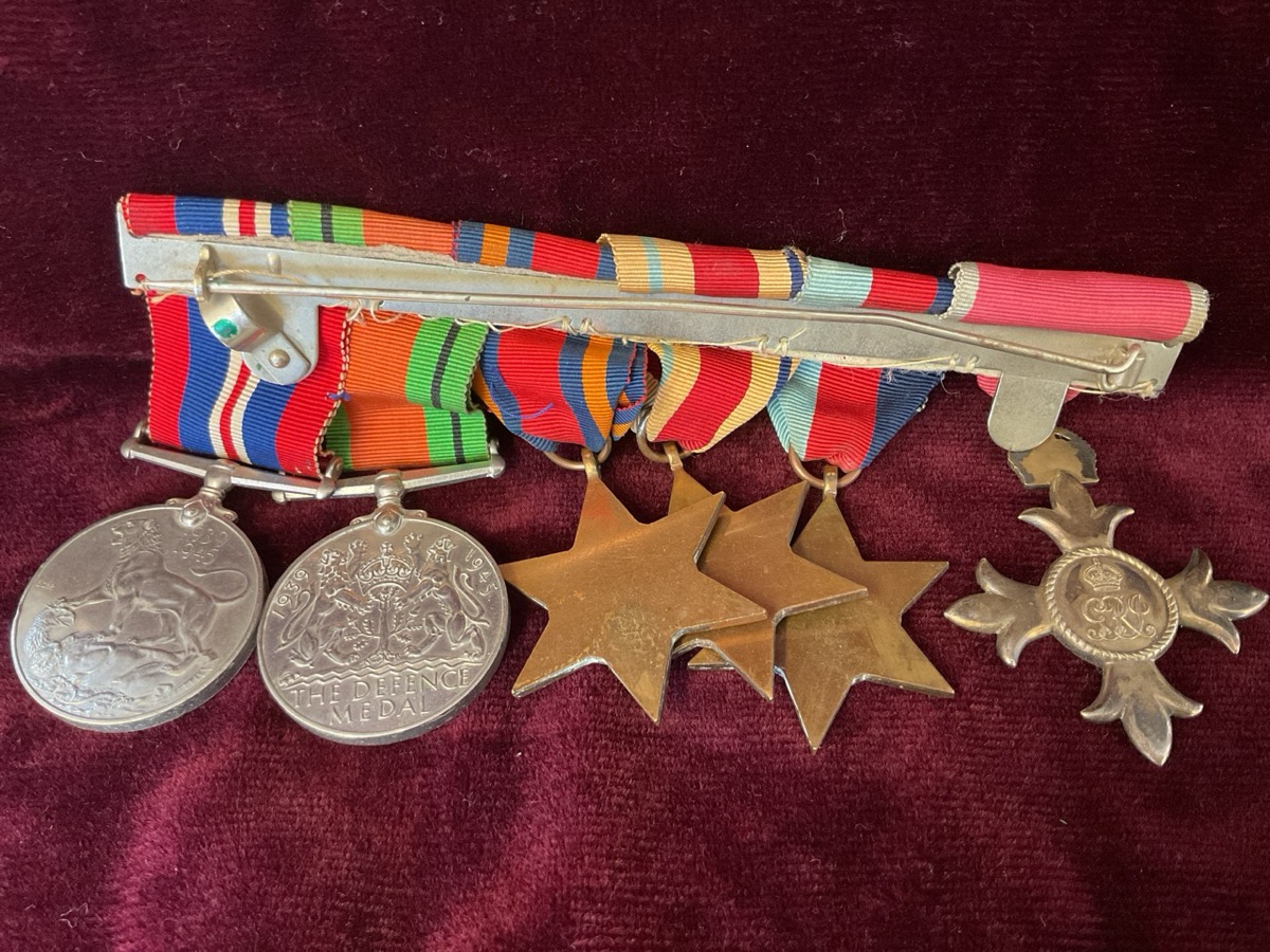 A bar of six medals - a post WWII OBE, the 1939-1945 Africa and Burma ...