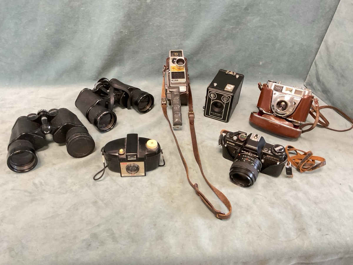 Two cased pairs of Commodore 10 x 50 field binoculars; and ...