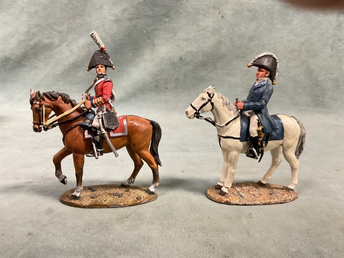 An officers leather Sam Brown belt; an ebonised swagger stick bearing ...