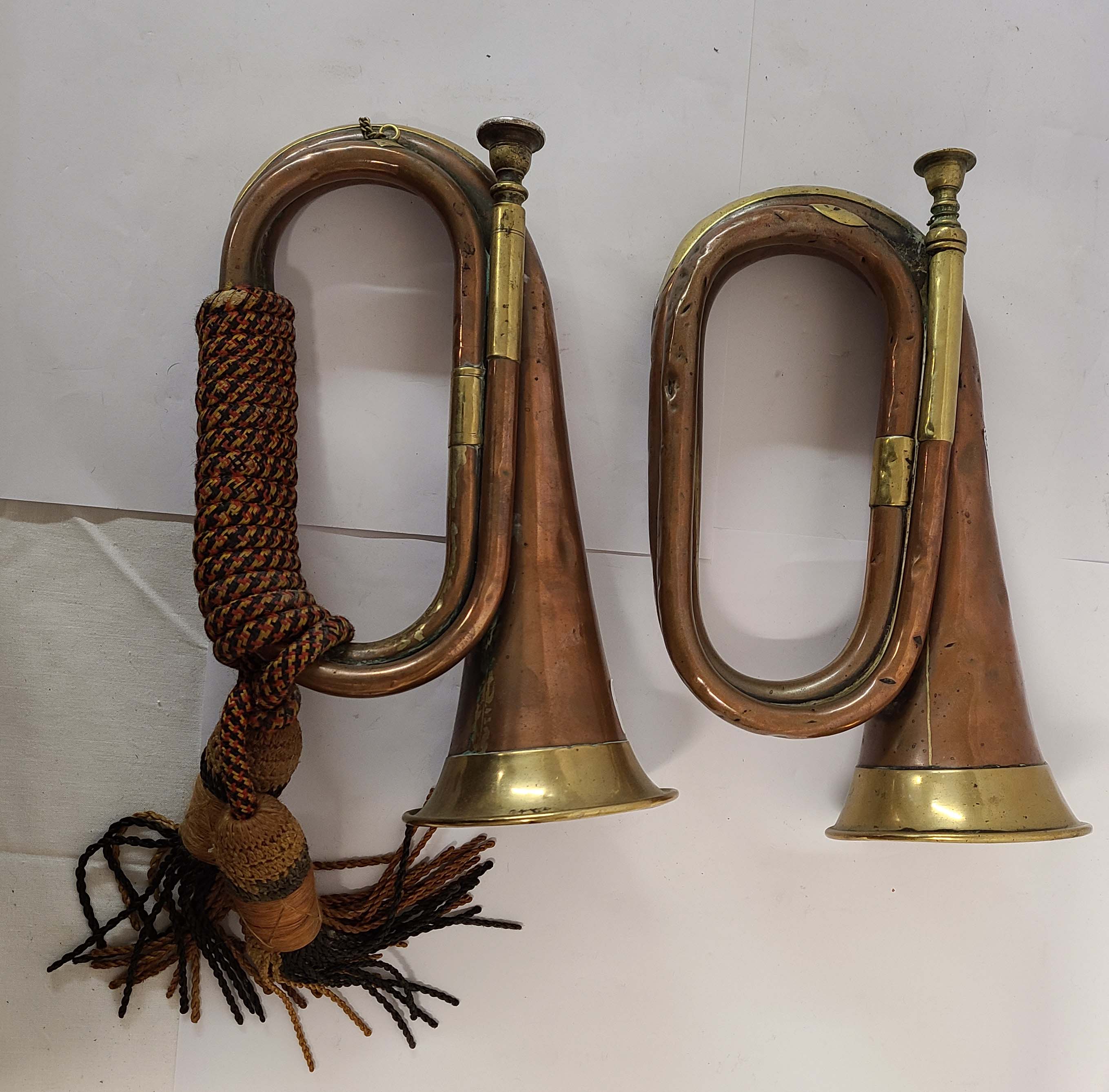 A Victorian copper and brass bugle marked for 'Henry Potter & Co, 30 ...
