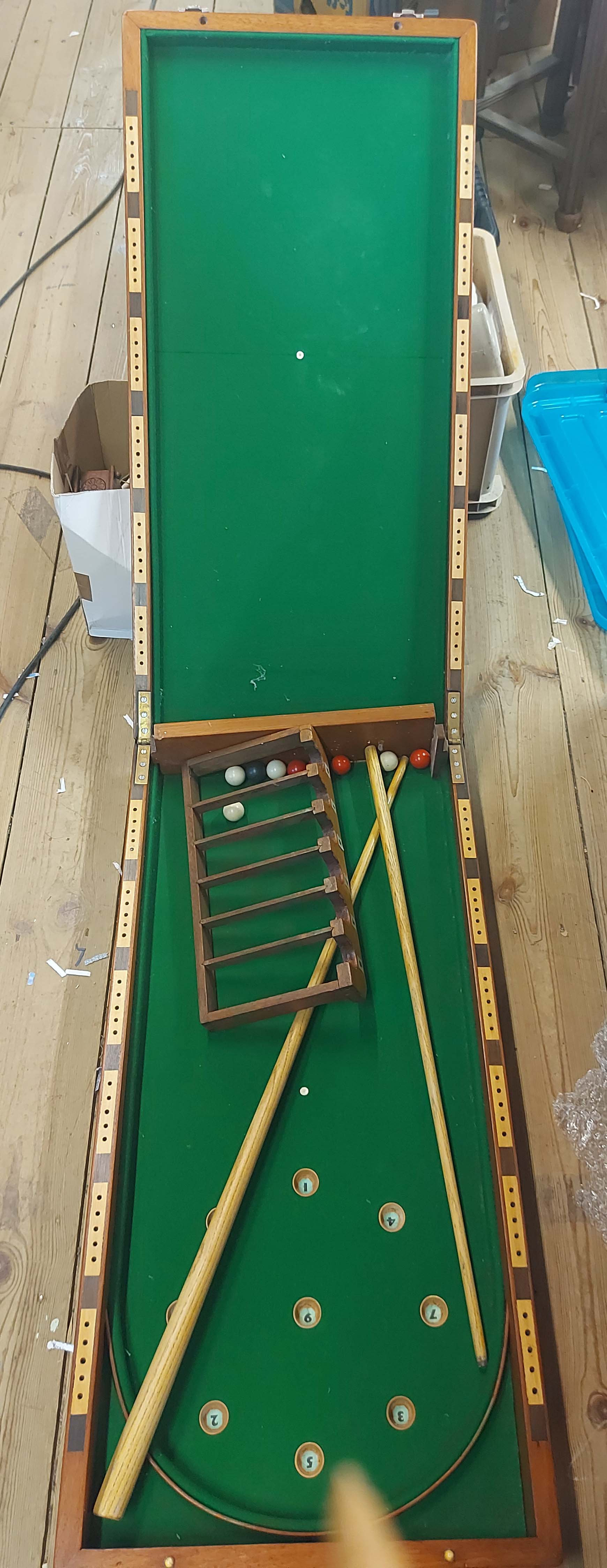 An antique bar billiard game