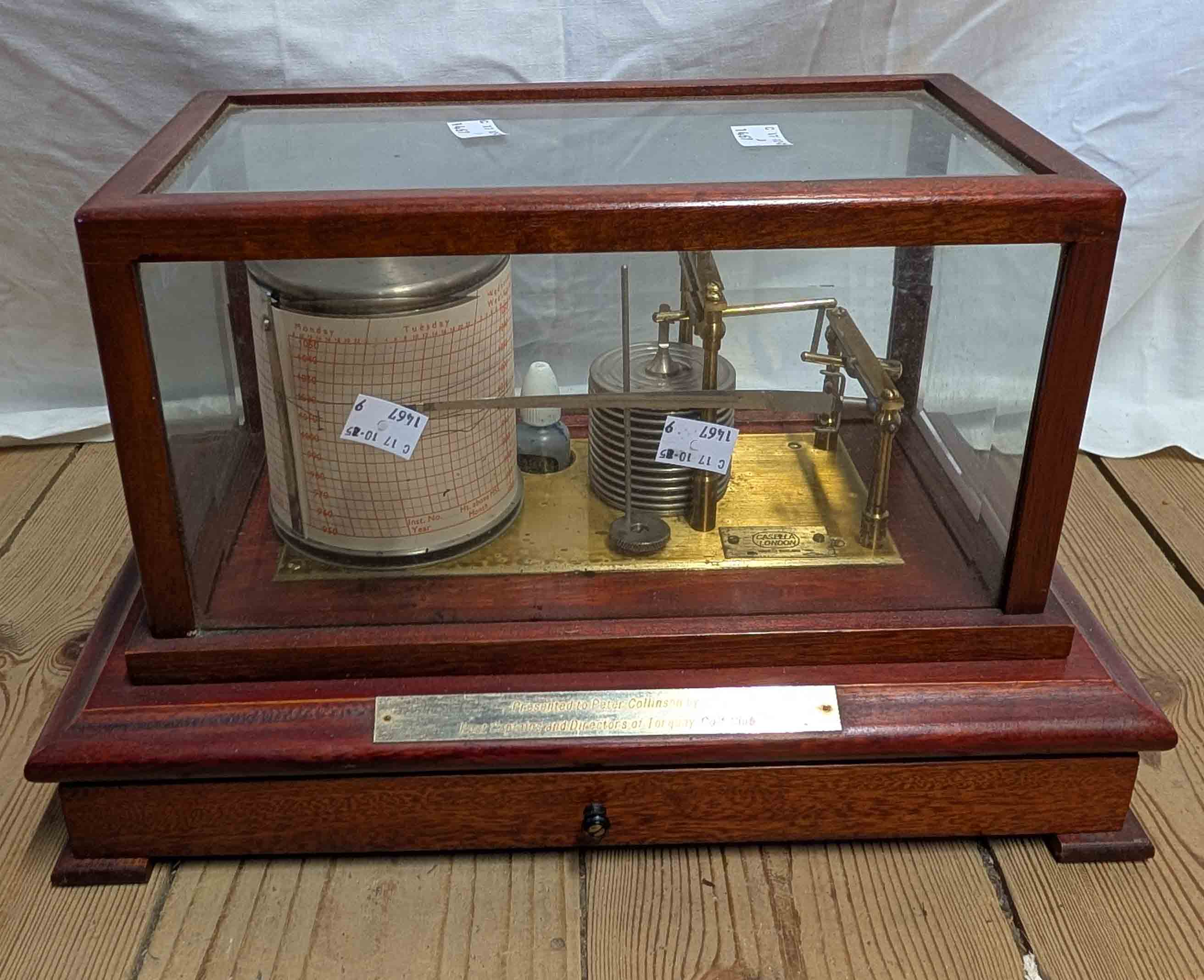 A barograph by Casella London - set in glazed wooden case