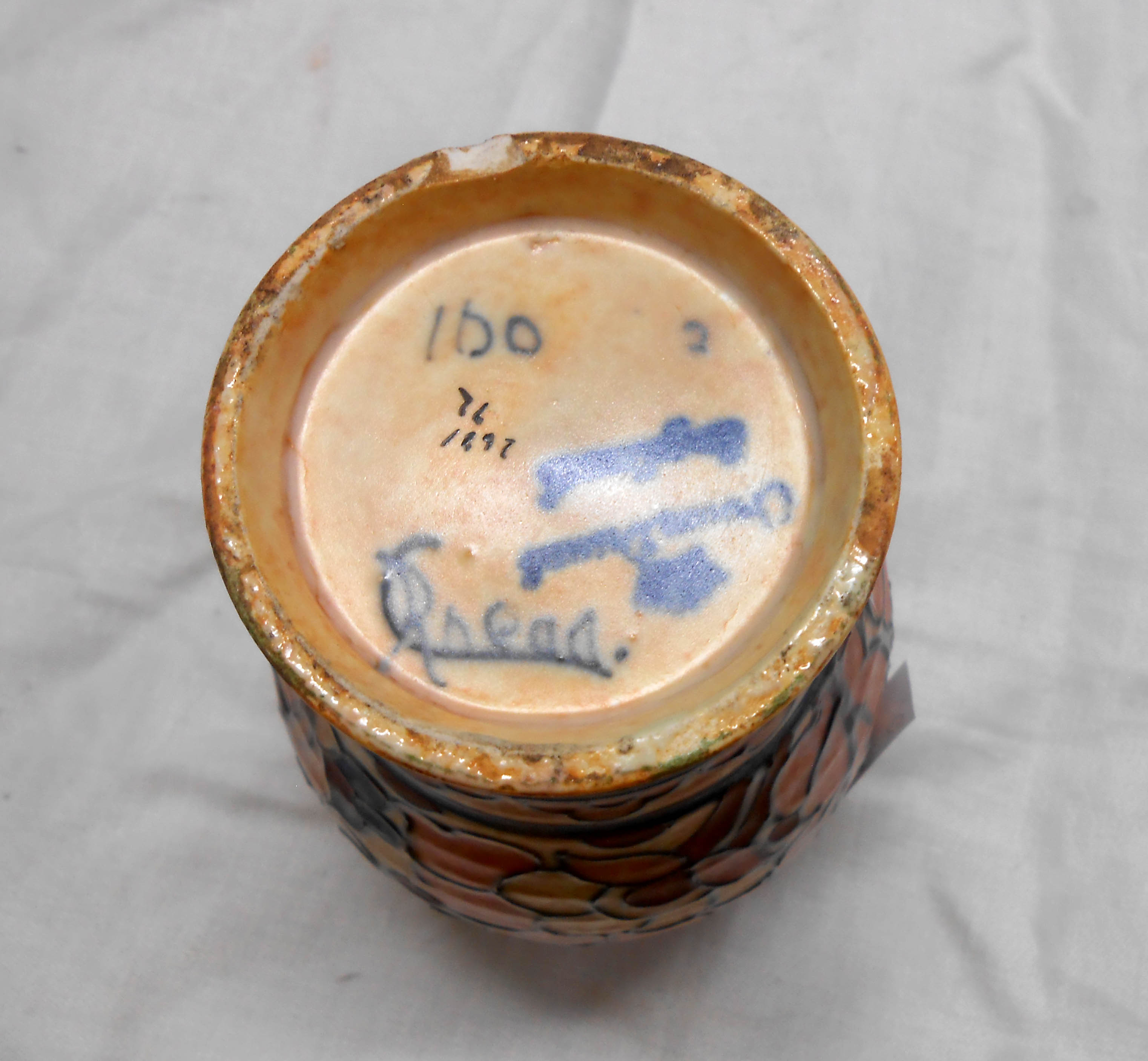 A small Crown Ducal Charlotte Rhead vase with tube-lined stylised ...