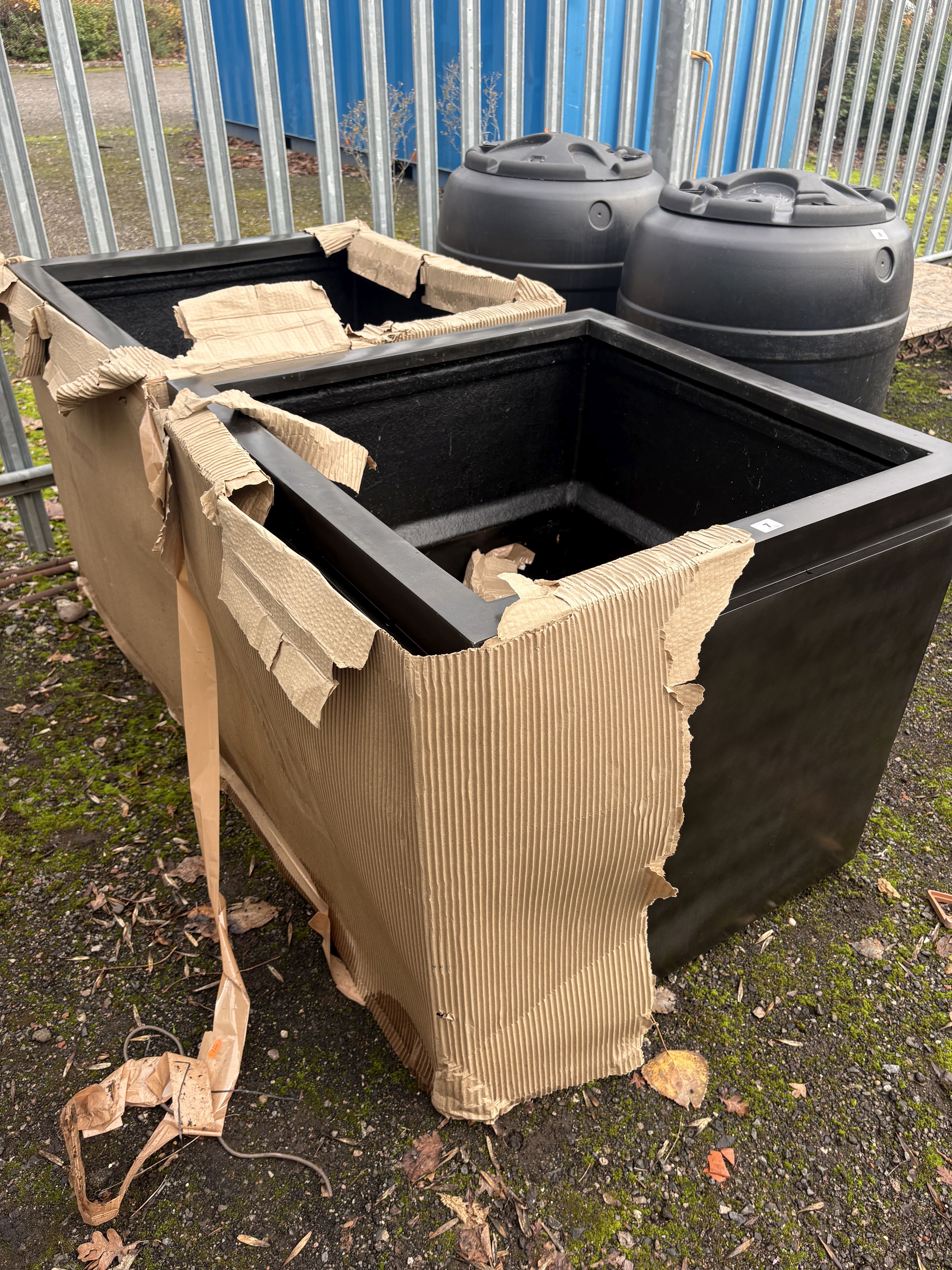 A PAIR OF LARGE BLACK FINISH FIBREGLASS PLANTER BOX, 80cm squared x ...