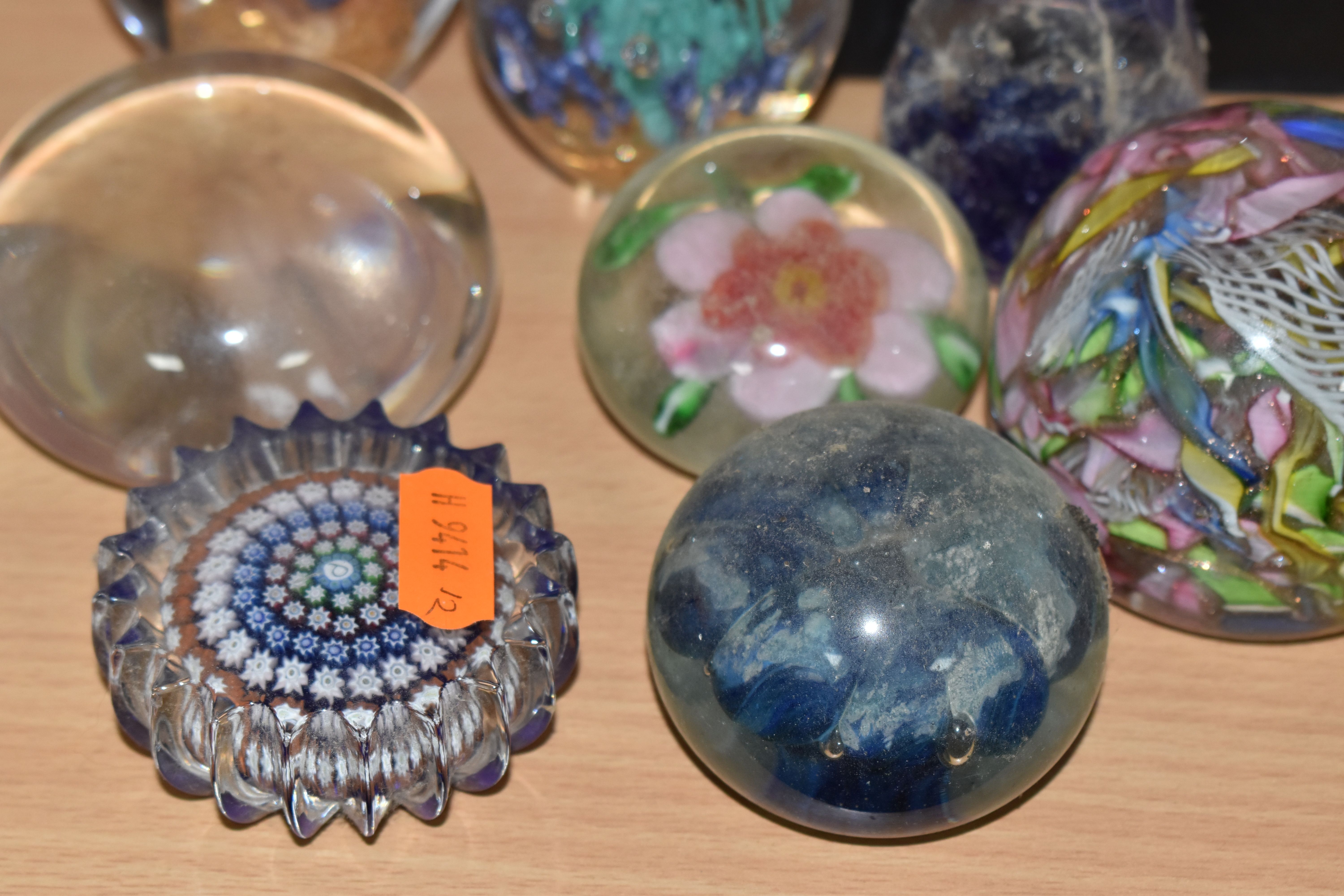 A GROUP OF GLASS PAPERWEIGHTS, to include a Caithness glass ink bottle ...