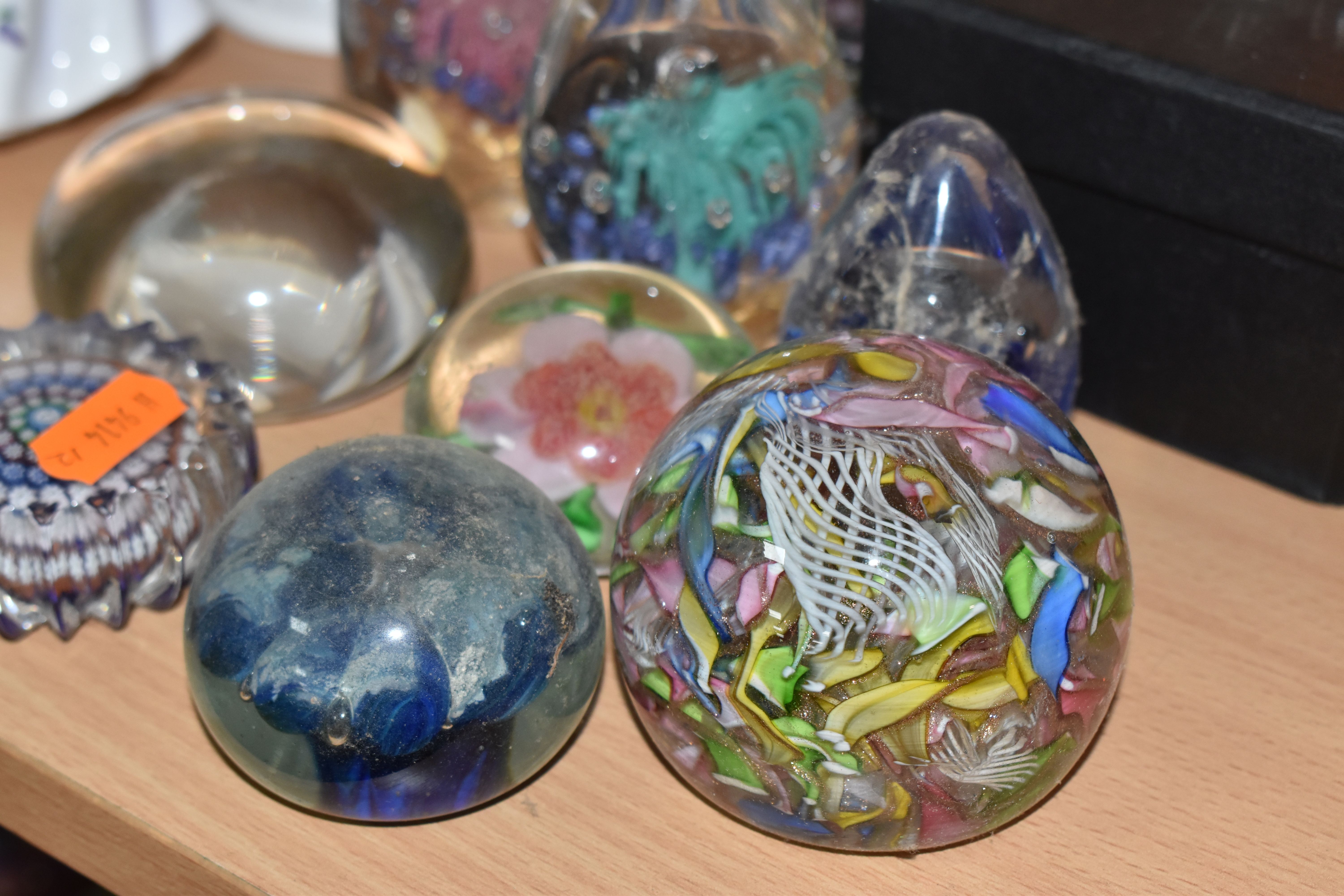 A GROUP OF GLASS PAPERWEIGHTS, to include a Caithness glass ink bottle ...