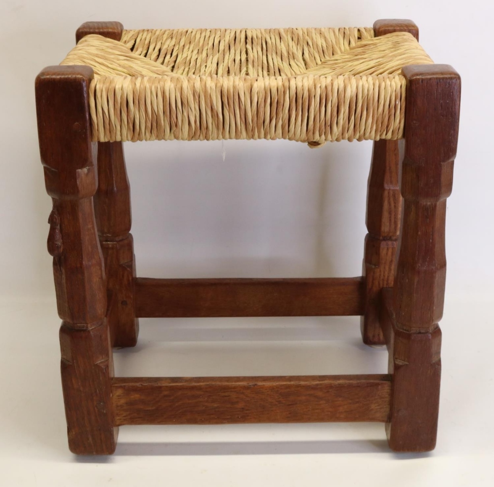 Robert Mouseman Thompson of Kilburn - an oak rectangular stool, rush ...