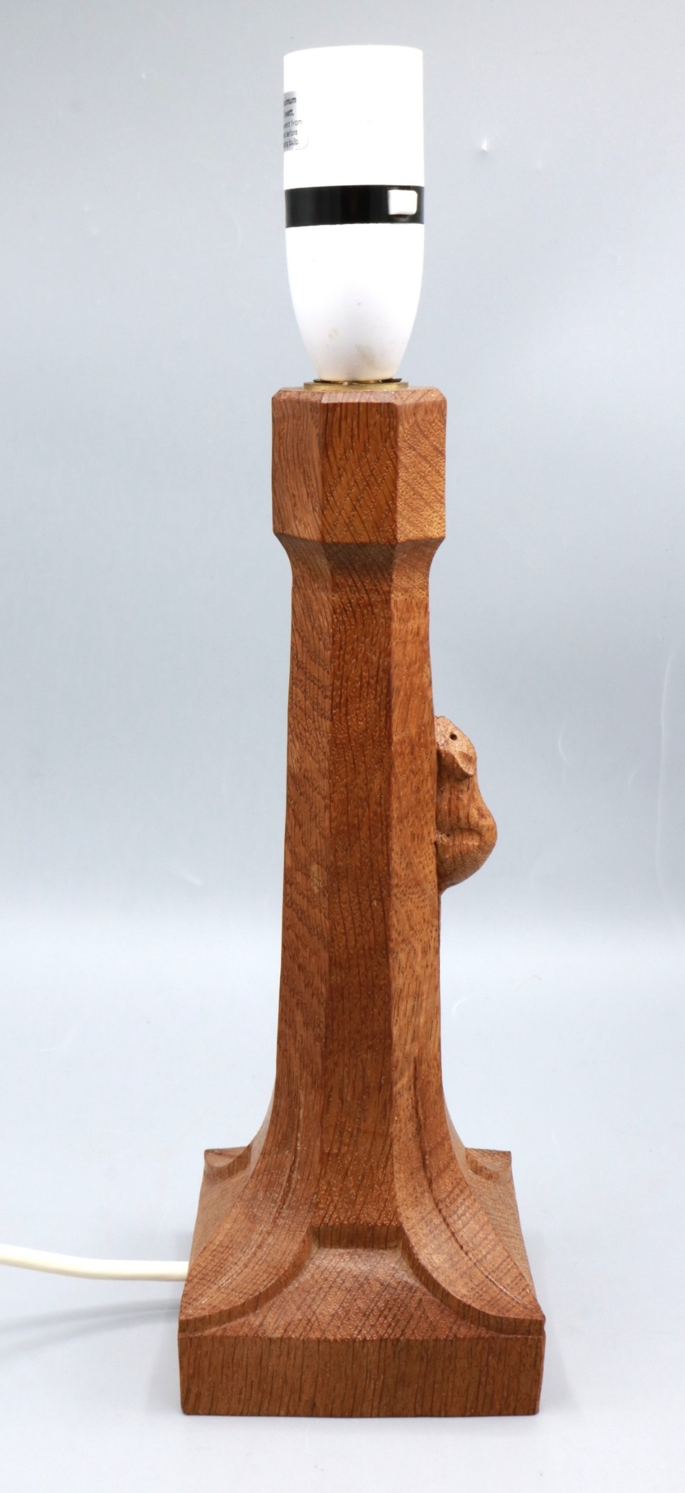 Robert Mouseman Thompson of Kilburn - an adzed oak table lamp, tapered ...