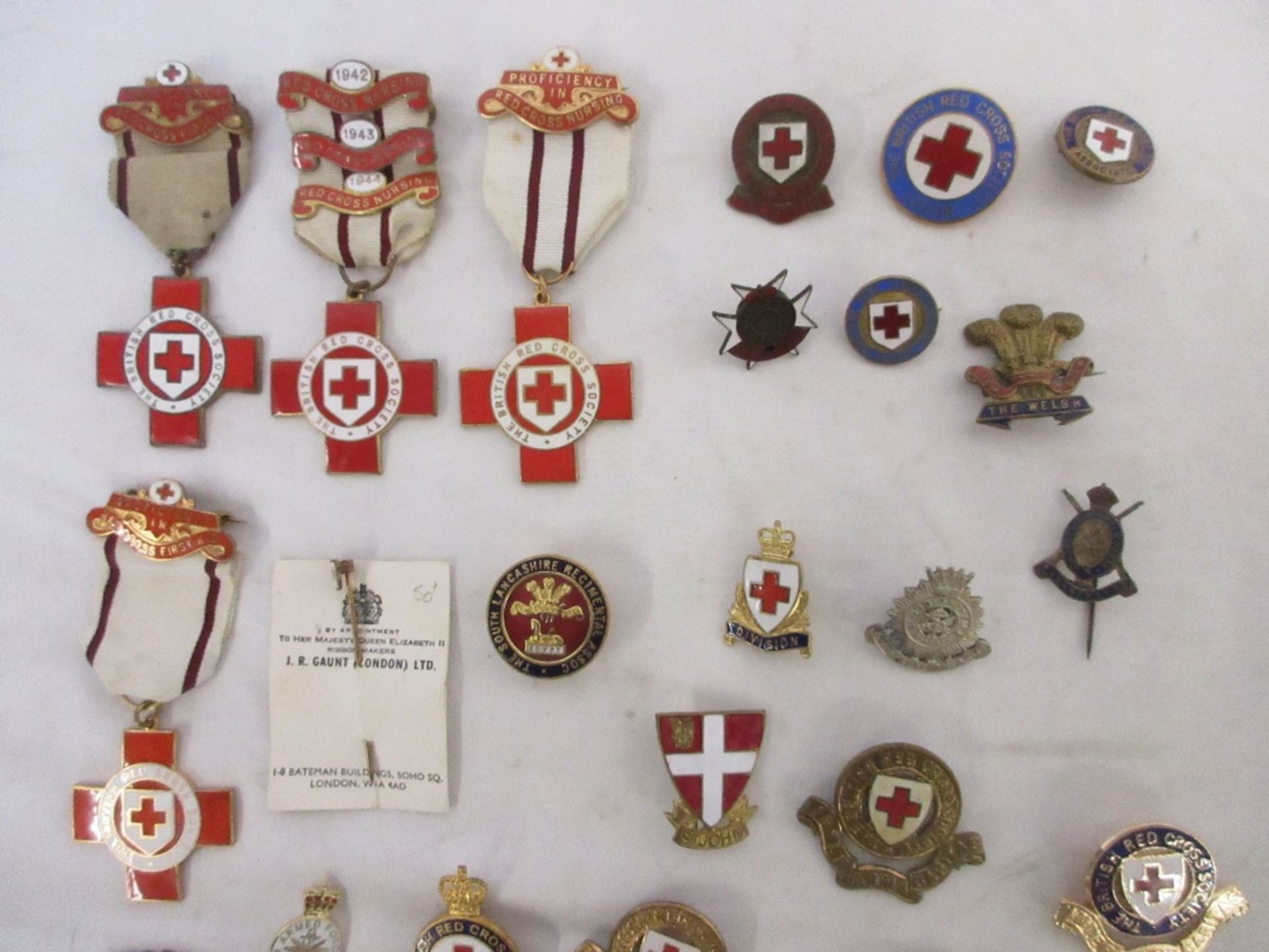 Collection of cap badges, pin badges etc. from the British Red Cross ...