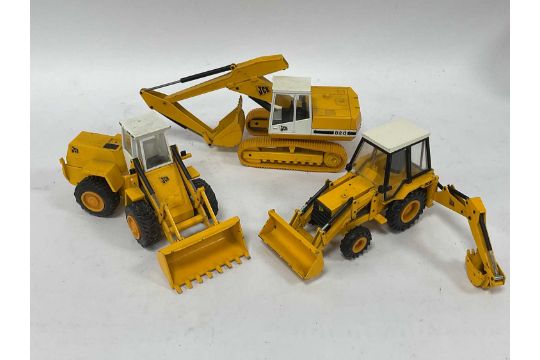 A Collection of Three Boxed NZG JCB Vehicles to Comprise: JCB 3CX ...