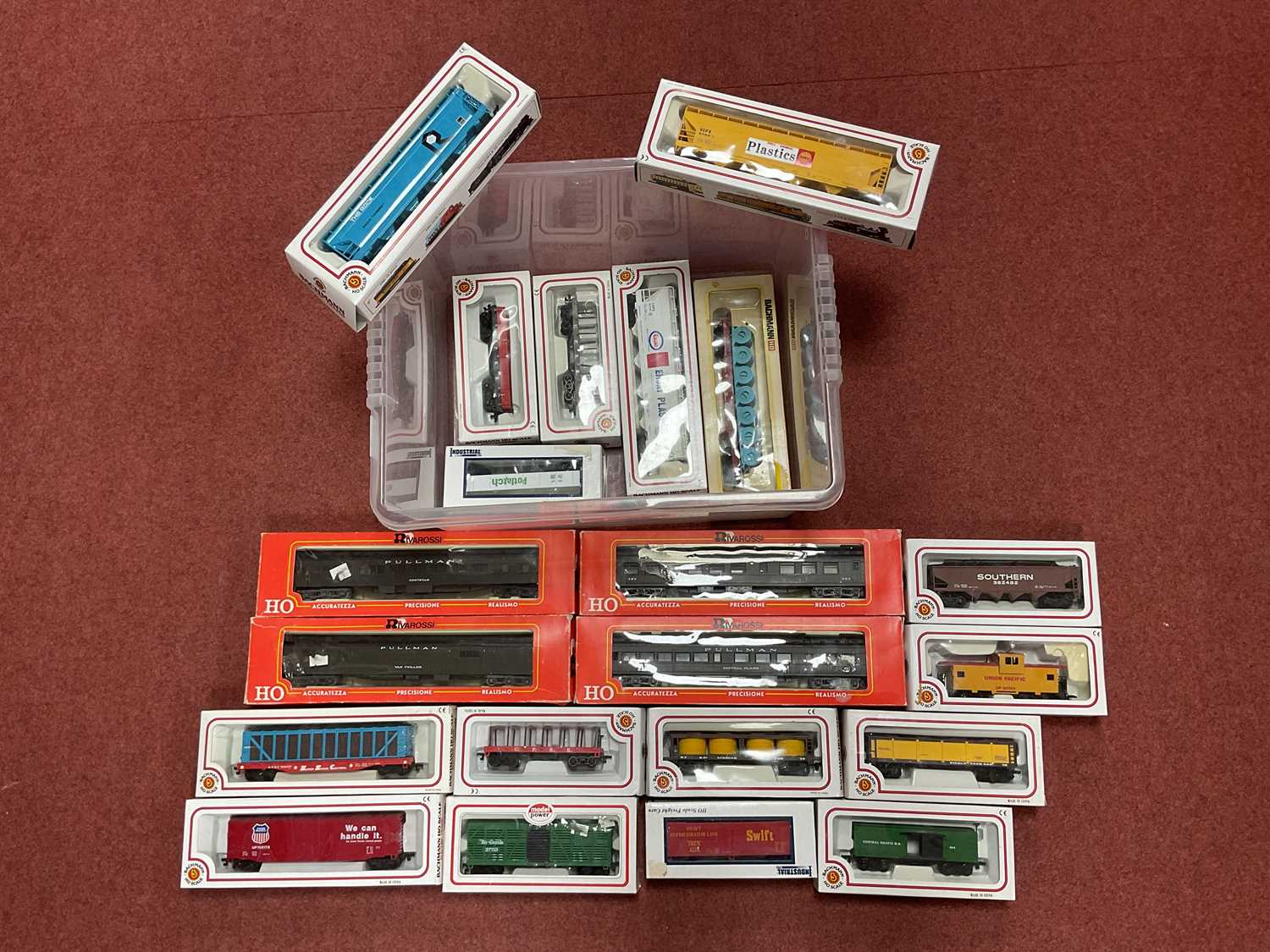 A collection of boxed HO scale American rolling stock, including ...