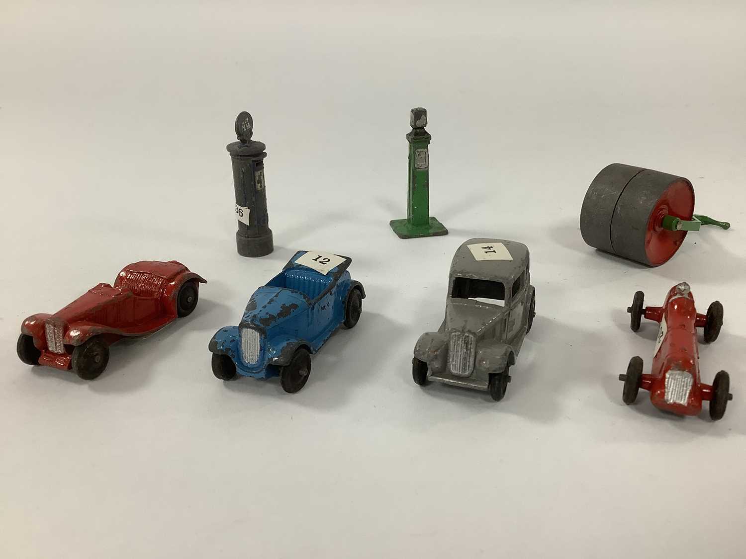 Four Immediate Post-War 'Small' Dinky Cars, including a grey saloon and ...