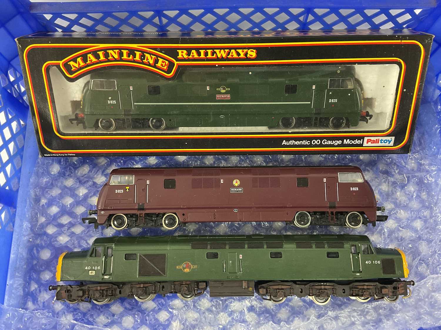 Three 00 gauge diesel locomotives: two Mainline "Warship" class "D825 ...
