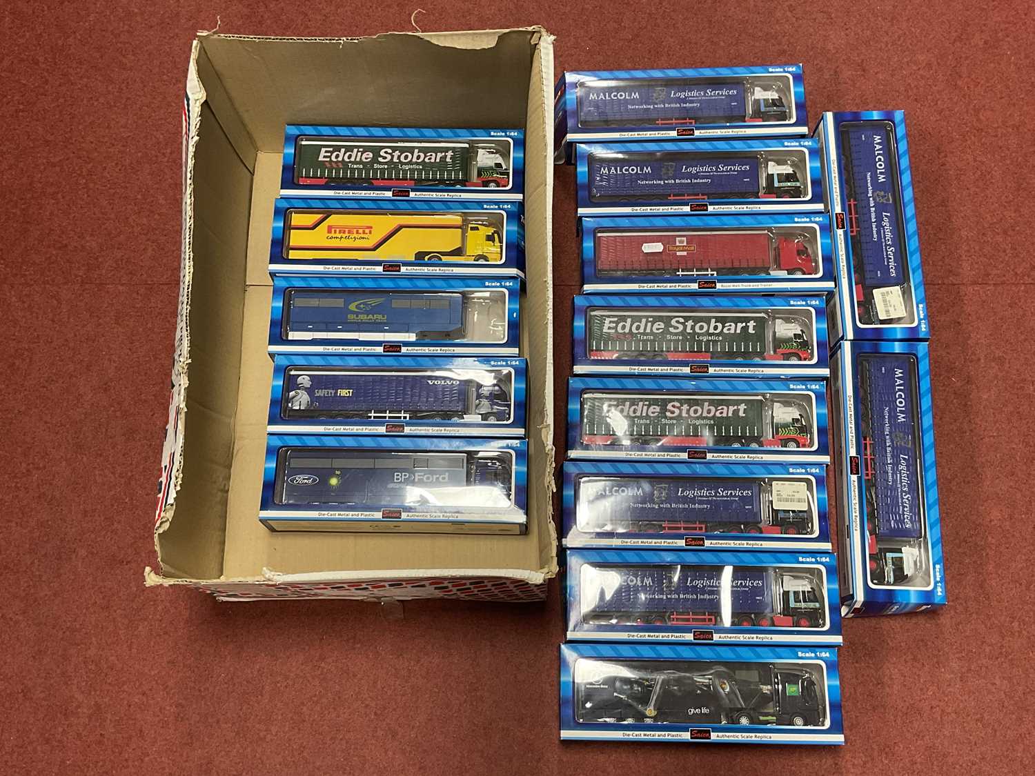 Fifteen Saico 1:64 Scale Diecast and Plastic Model Commercial Vehicles ...