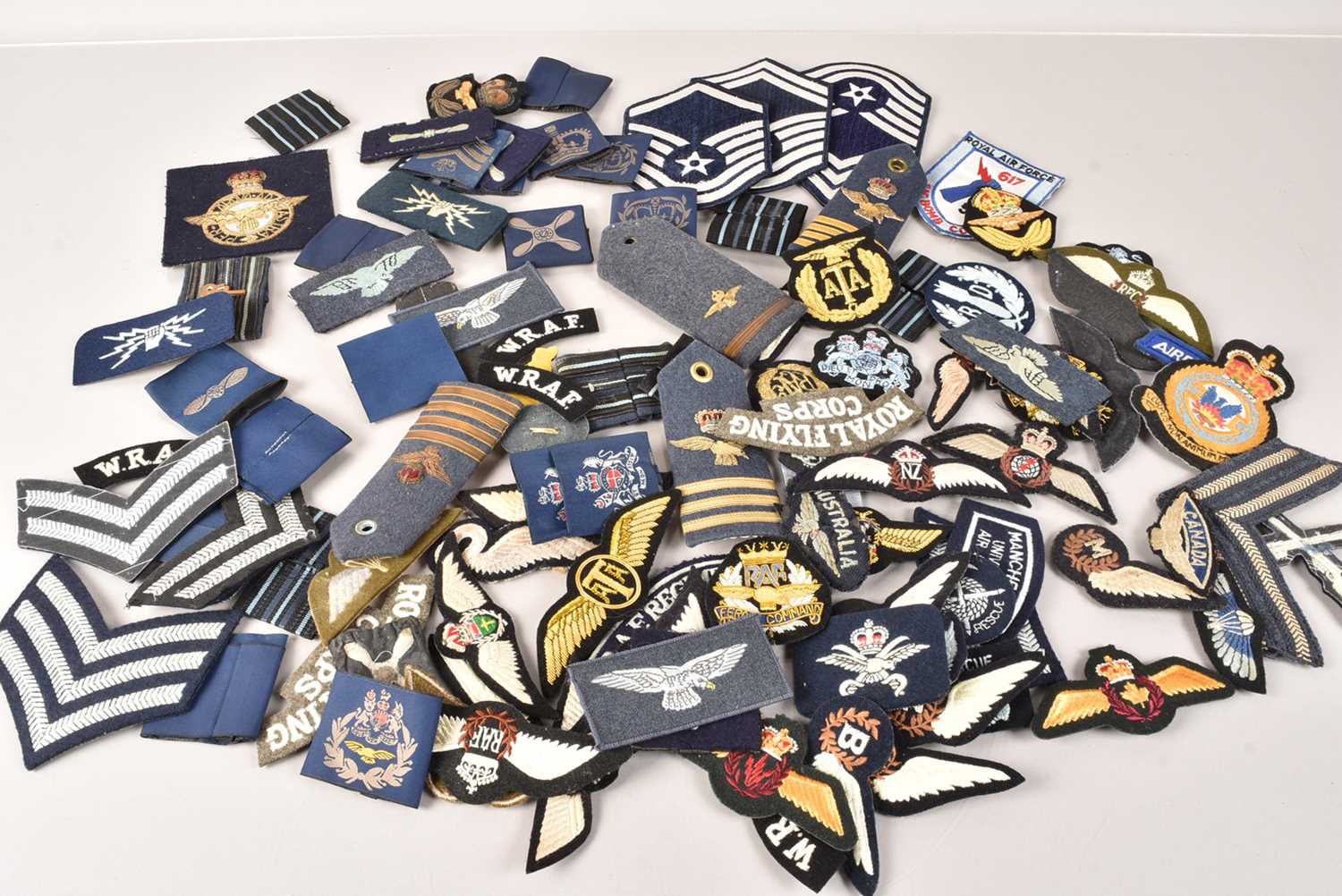 A large collection of RAF badges, including Cloth, Wings, Ranks ...