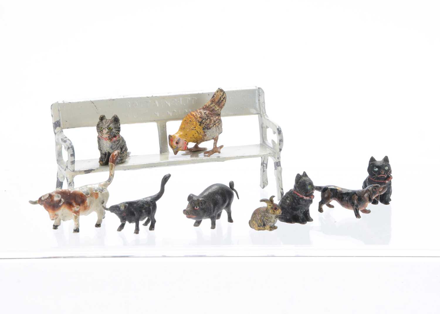 Viennese cold painted bronze miniature animals, two seated black and a ...