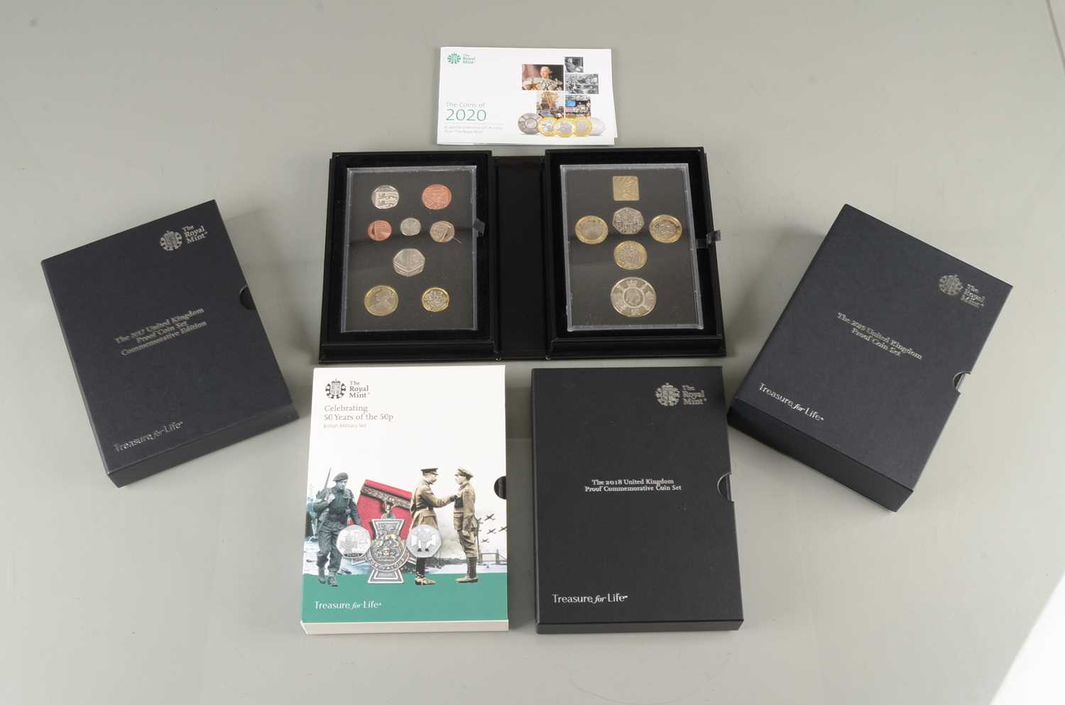 Five Royal Mint proof year sets, including a 2017 commemorative proof ...