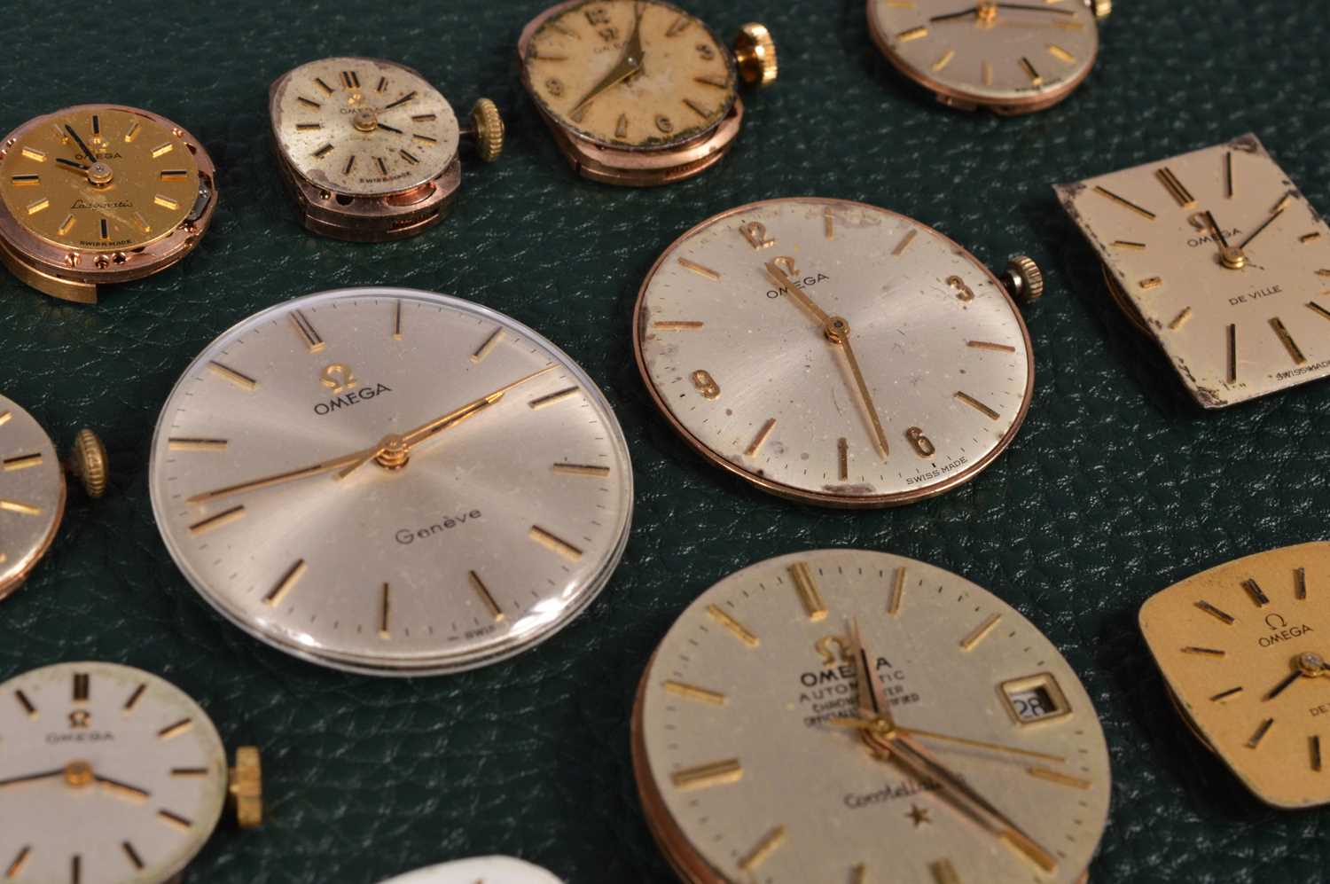 A group of Omega watch movements, including one Constellation Automatic ...