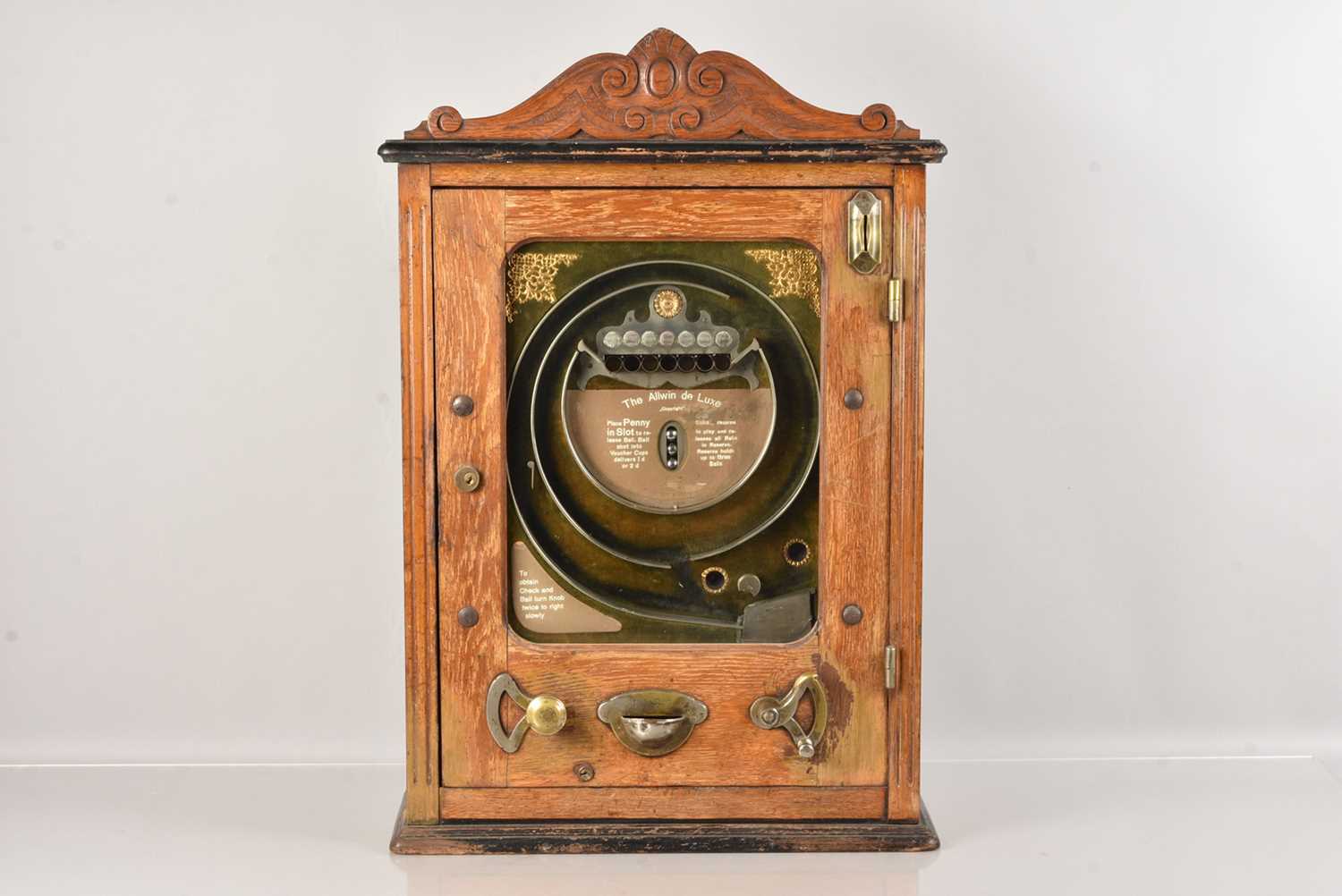 An early 20th Century Allwin De Luxe Penny Slot Machine, operates with ...