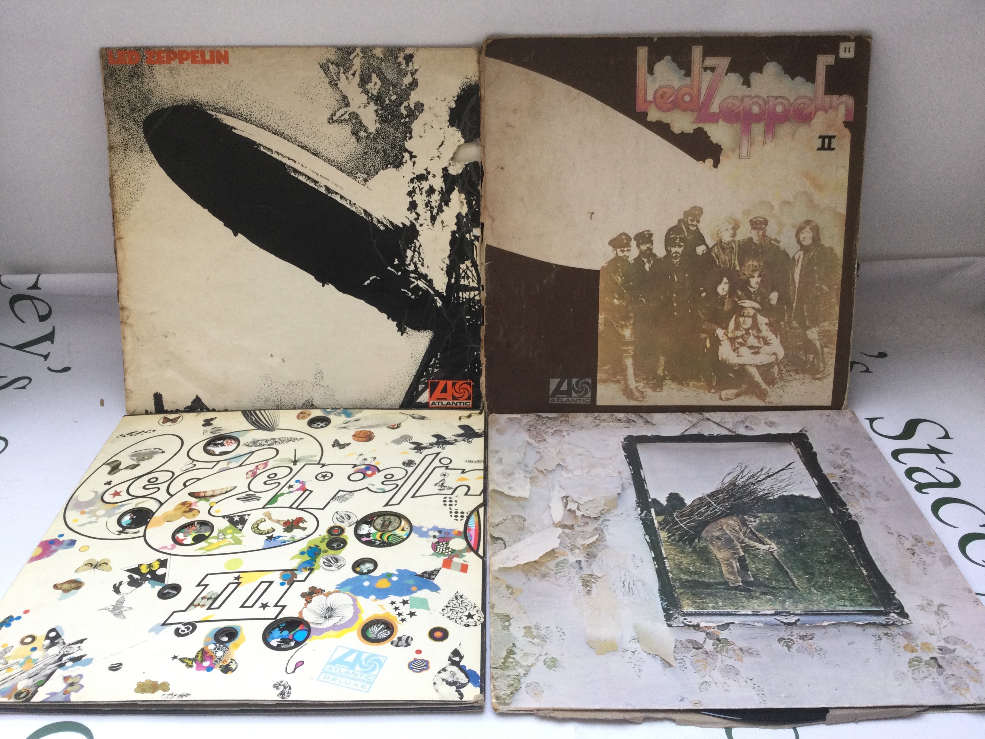 The first four Led Zeppelin LPs on red/plum Atlantic labels. All have ...