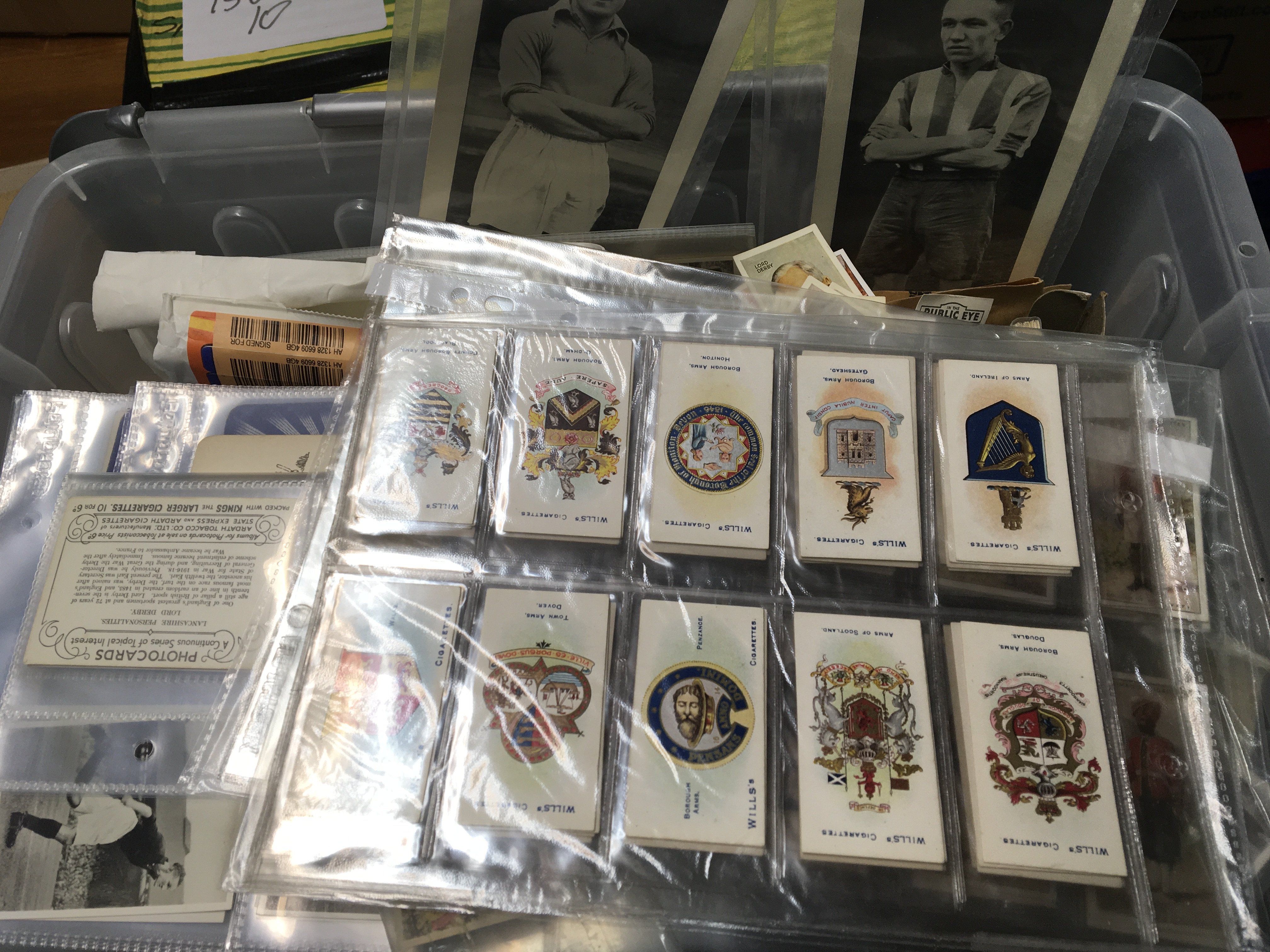 A box containing an extensive collection of vintage cigarette cards and ...