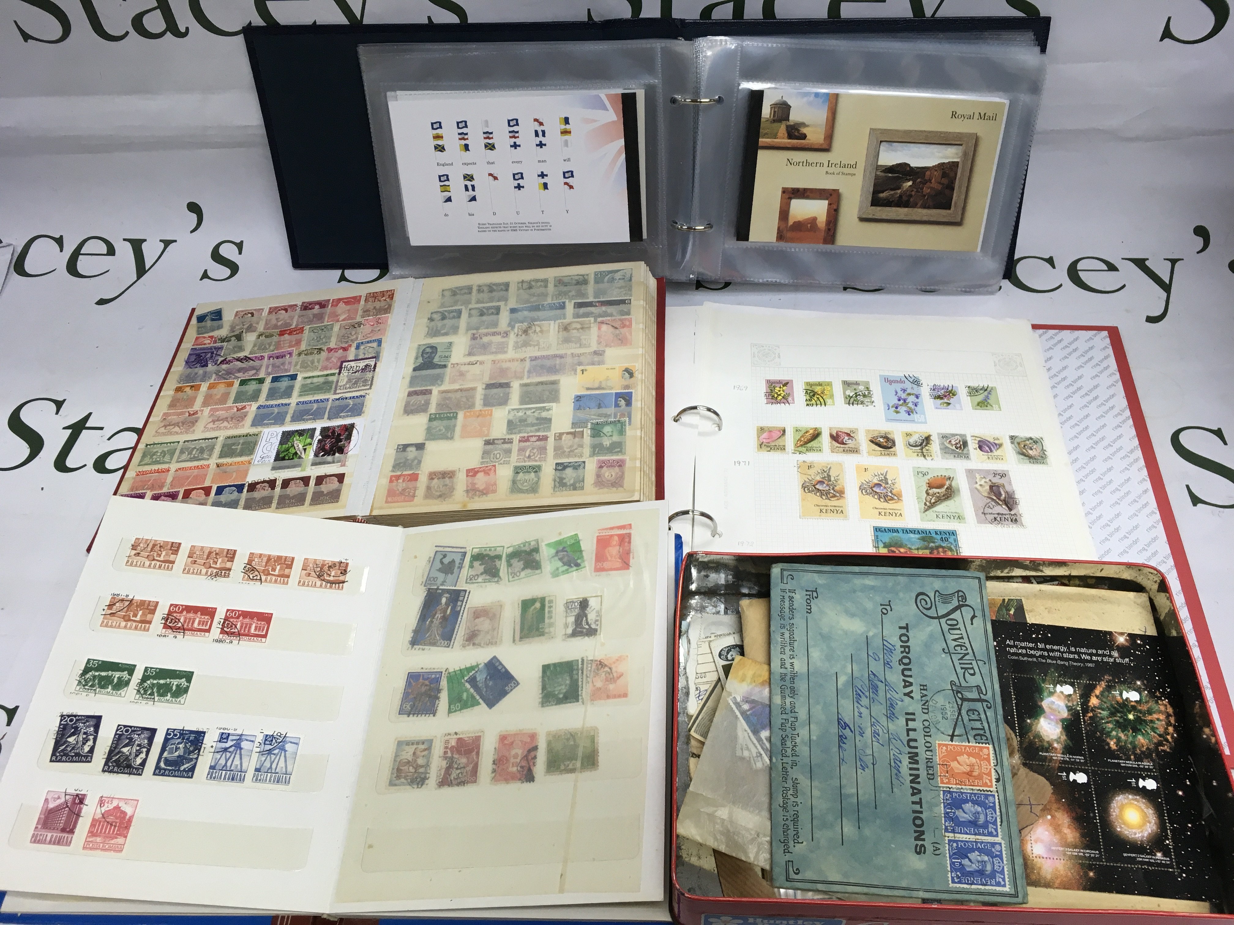 Three boxes of stamps and first day covers. Shipping category D.