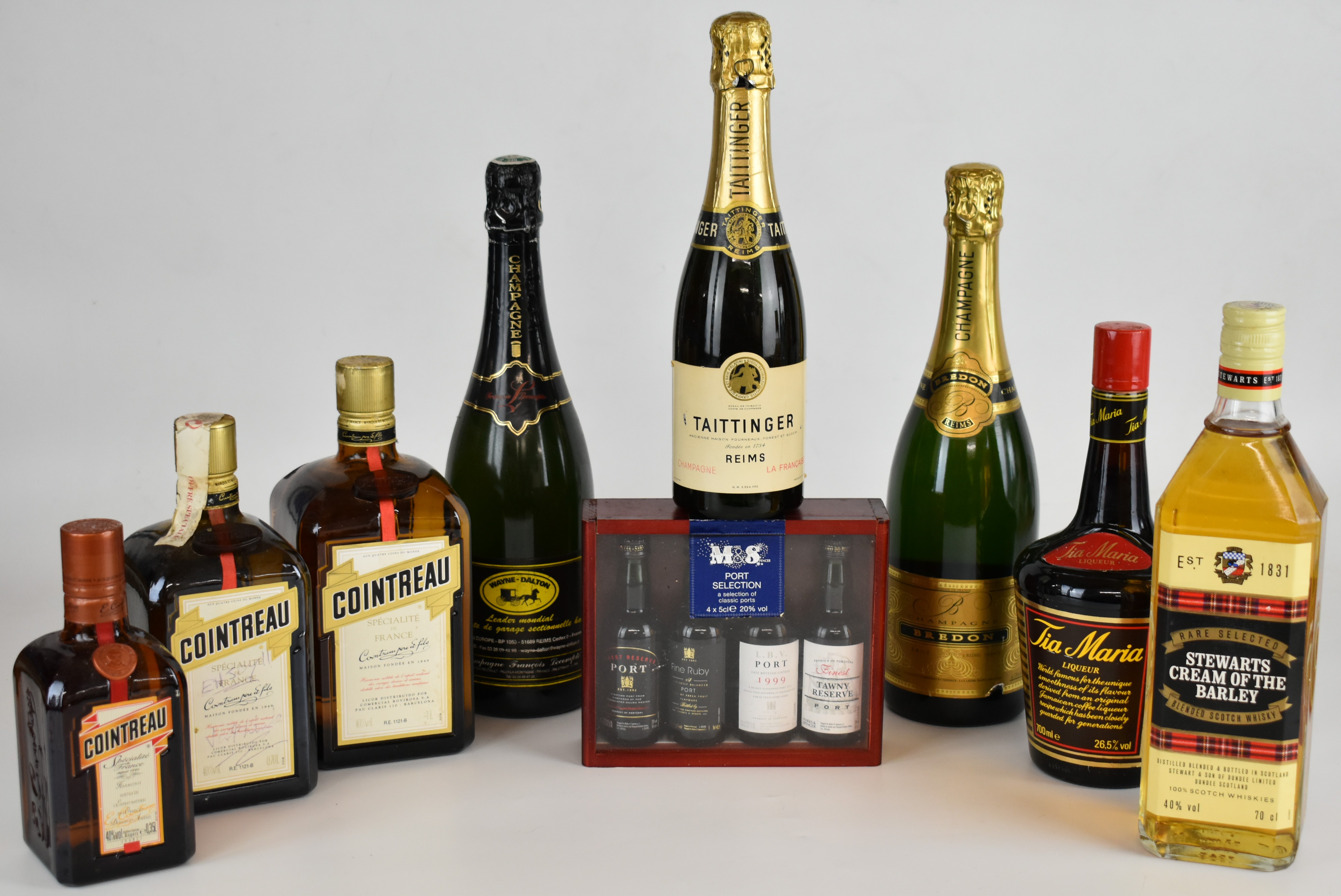 Eight bottles of mixed spirits, Champagne and liqueurs to include ...