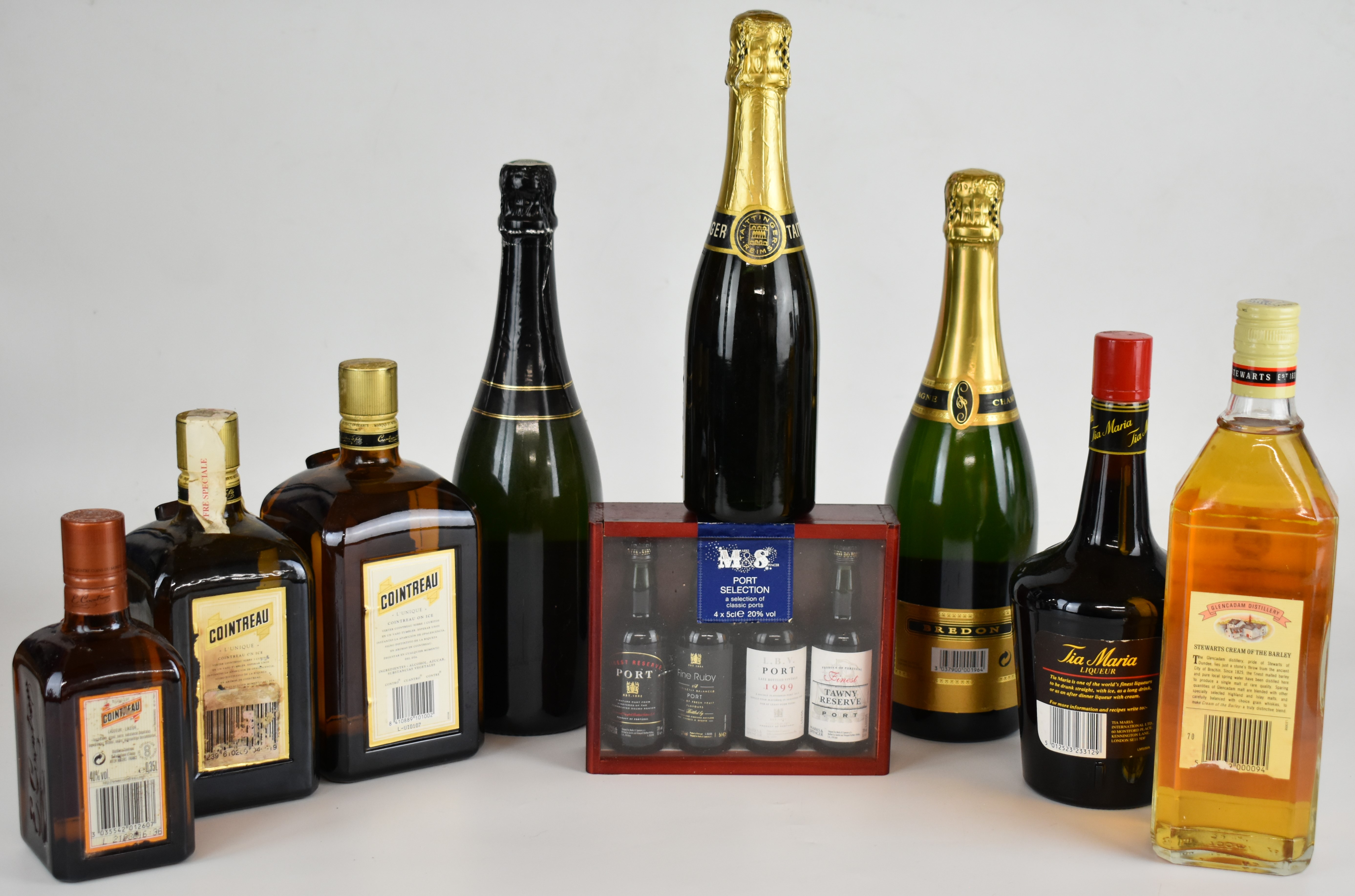 Eight bottles of mixed spirits, Champagne and liqueurs to include ...